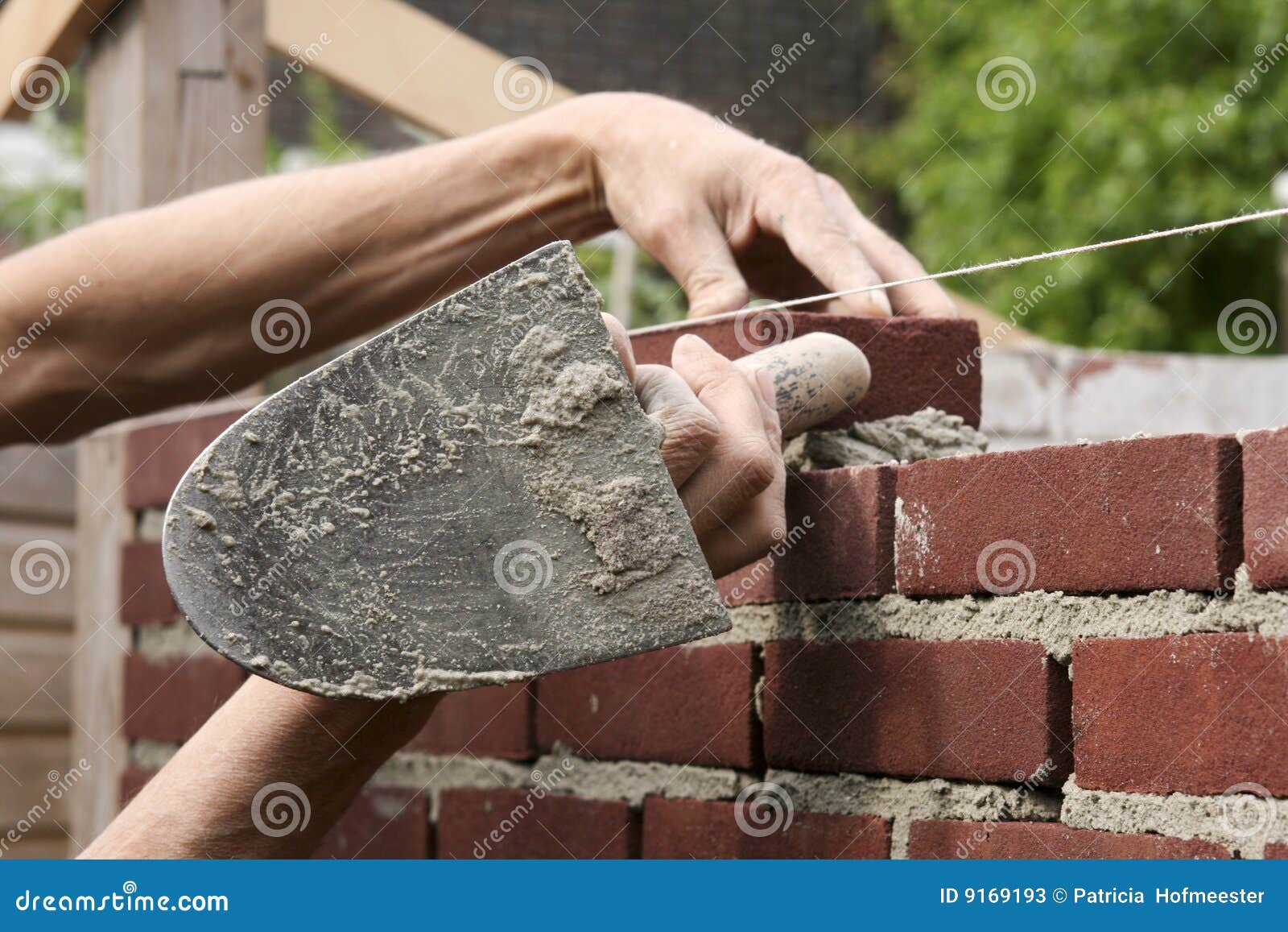Bricklayer at work stock image. Image of blocks, hard - 9169193
