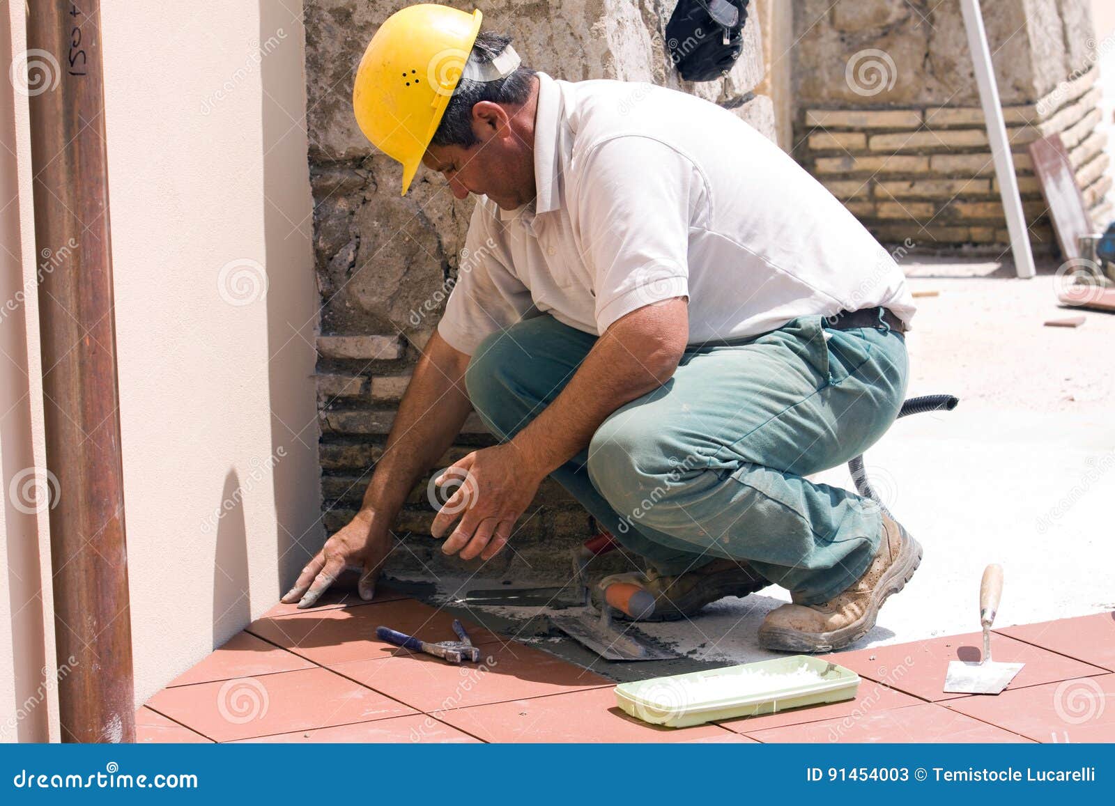 Bricklayer at work stock image. Image of activity, manual - 91454003