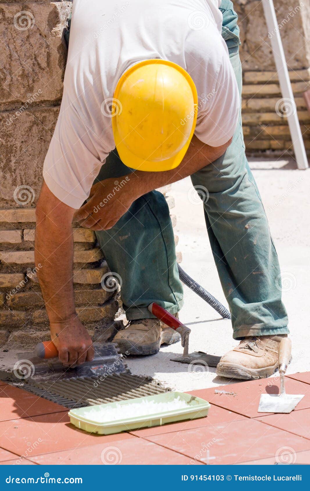 Bricklayer at work stock image. Image of occupation, home - 91454103