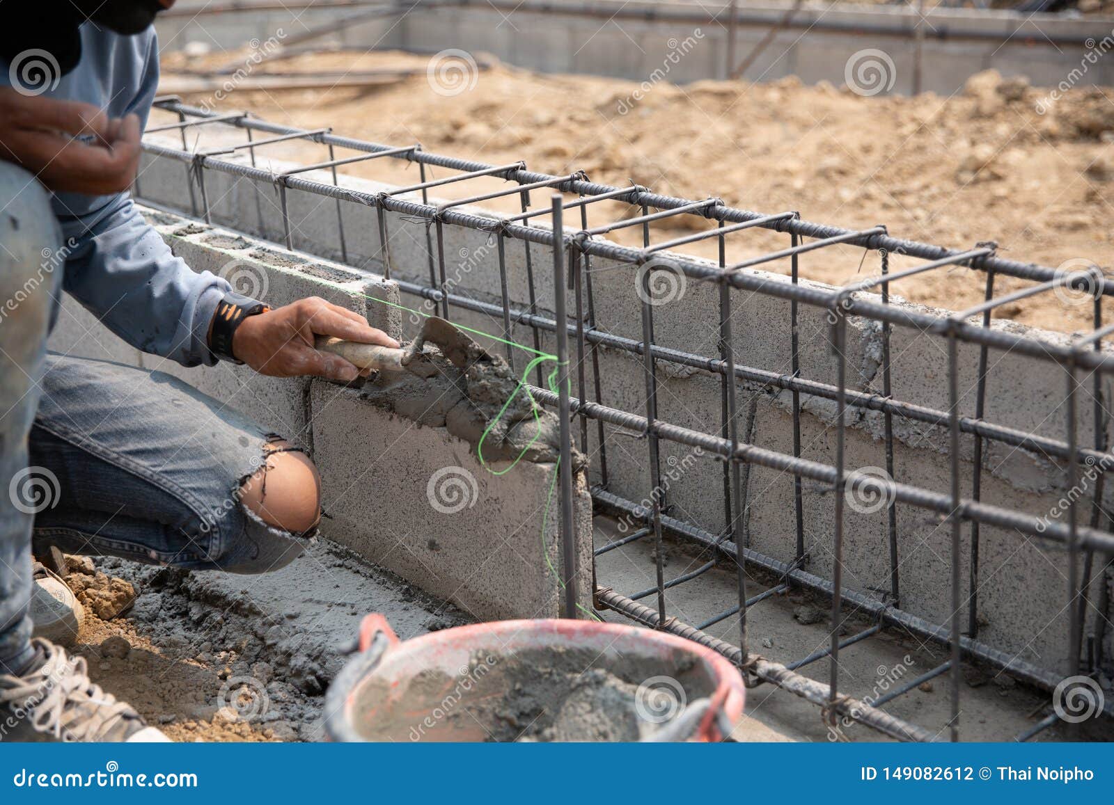 Bricklayer Worker Installing Brick Masonry on Exterior Wall Stock Photo ...