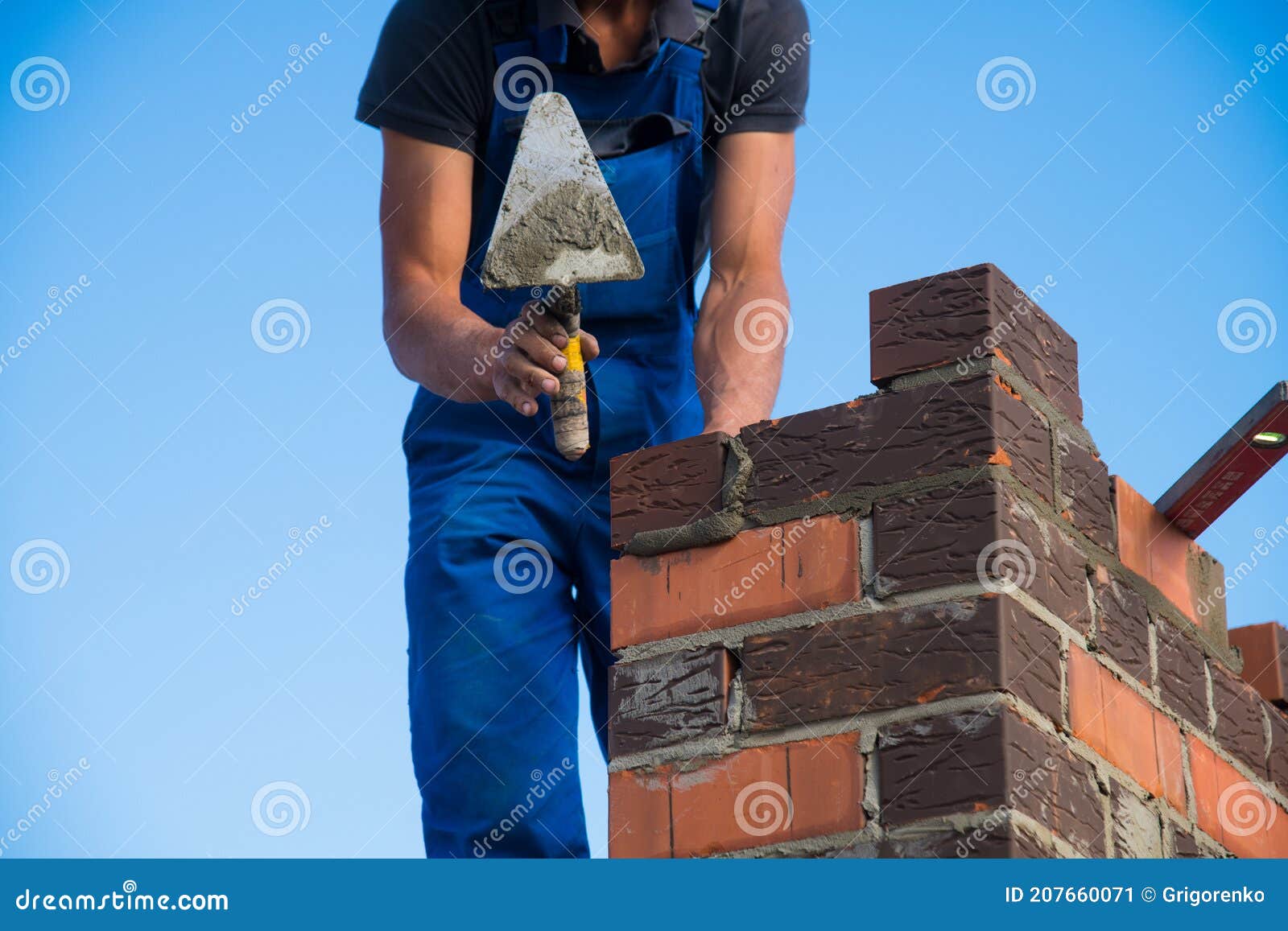 Bricklayer Worker Installing Brick Masonry on Exterior Wall Stock Image ...