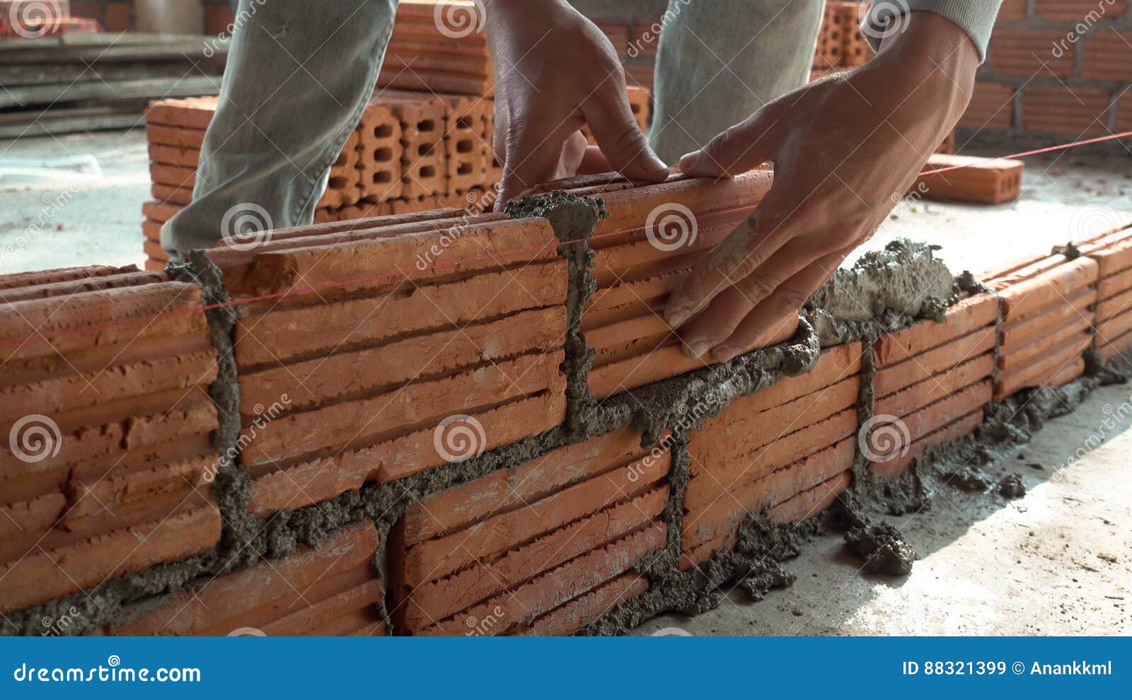 Bricklayer Worker Installing Brick Masonry on Exterior Wall Stock Image ...