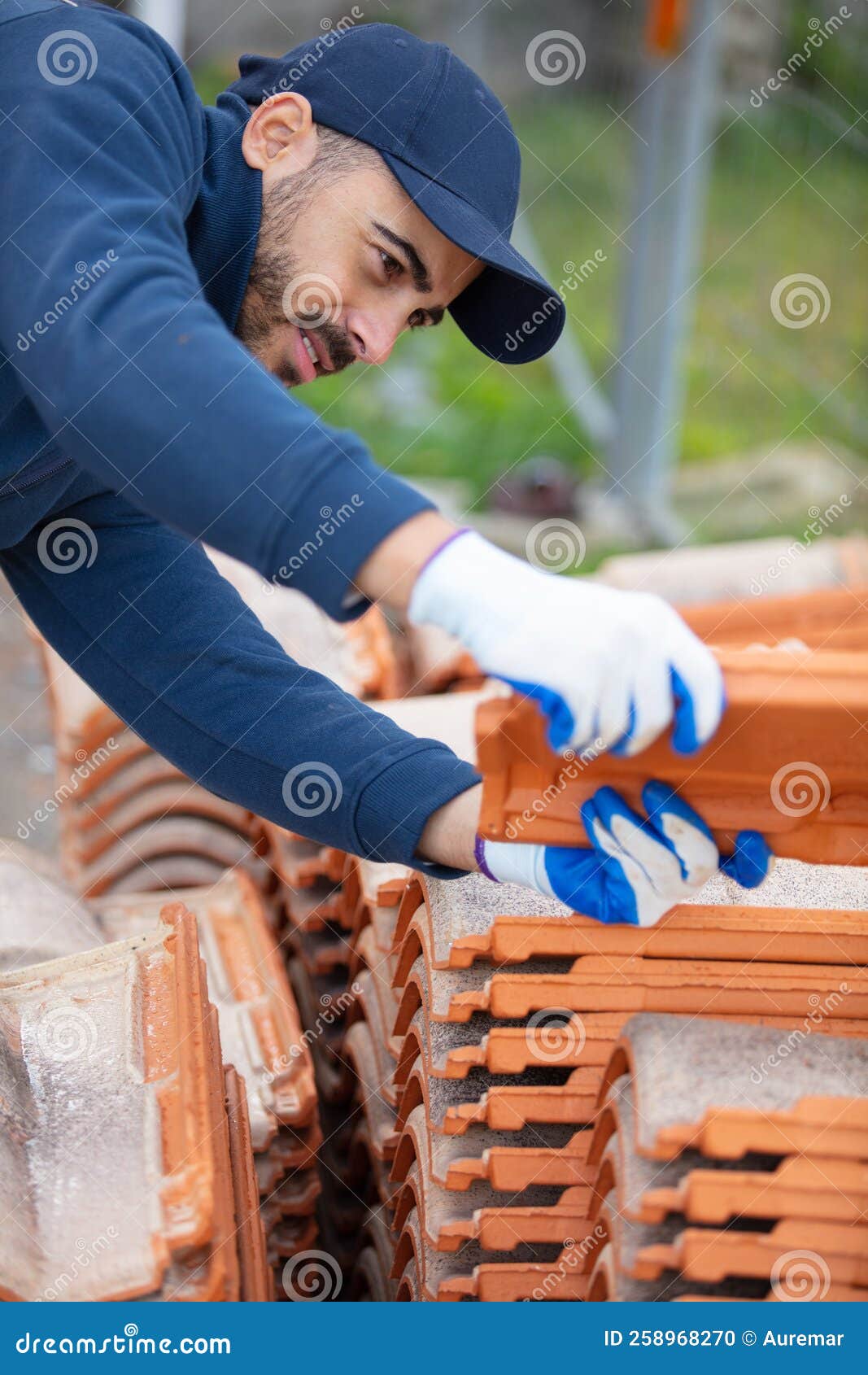 Bricklayer Working With Ceramsite Concrete Blocks. Walling Stock ...