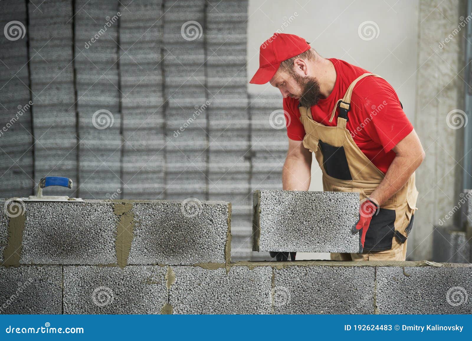 Bricklayer Working with Ceramsite Concrete Blocks. Walling Stock Image ...