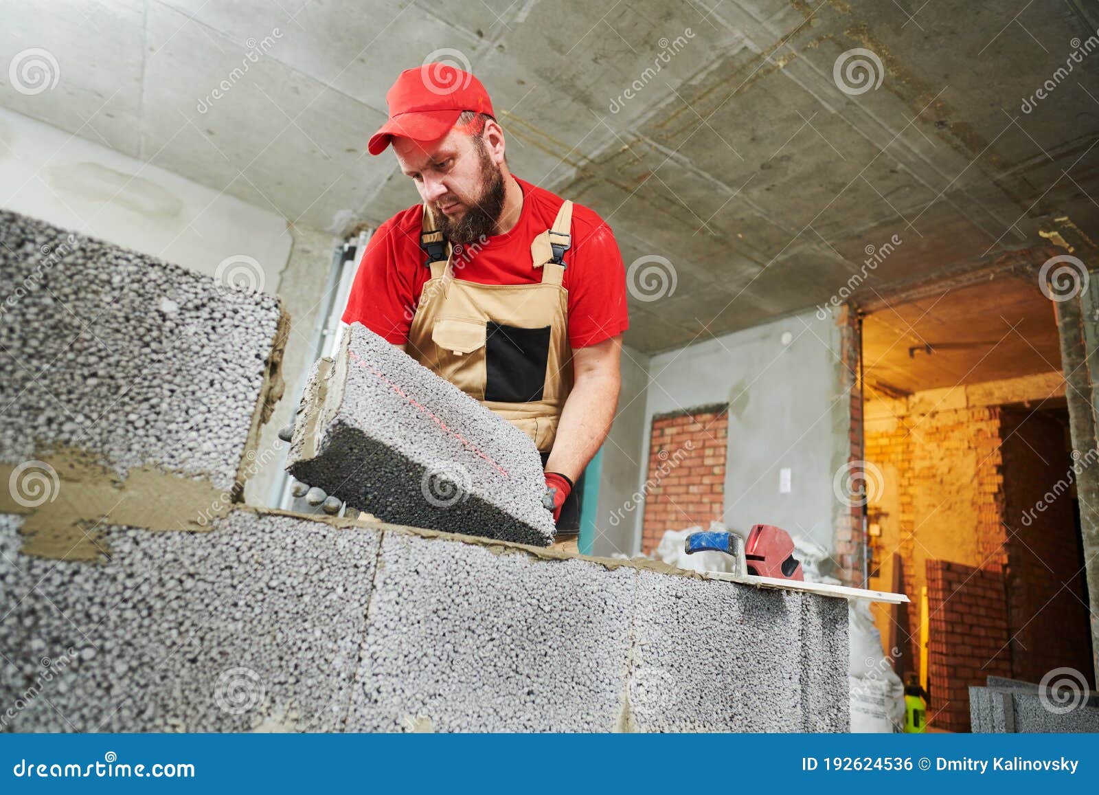 Bricklayer Working with Ceramsite Concrete Blocks. Walling Stock Photo ...
