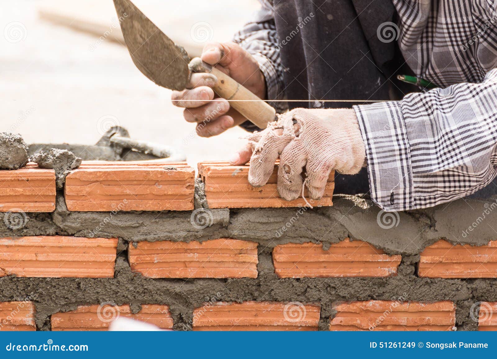 Bricklayer Working With Ceramsite Concrete Blocks. Walling Stock ...