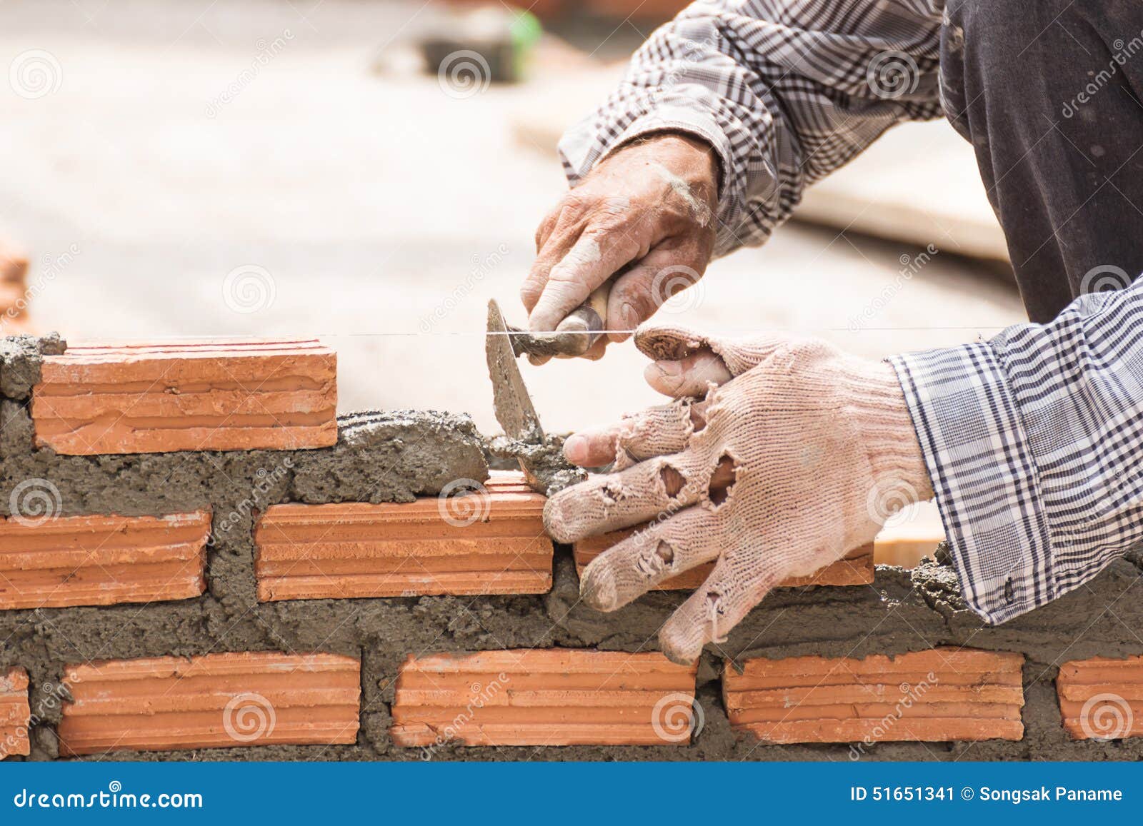 Bricklayer Working With Ceramsite Concrete Blocks. Walling Stock ...