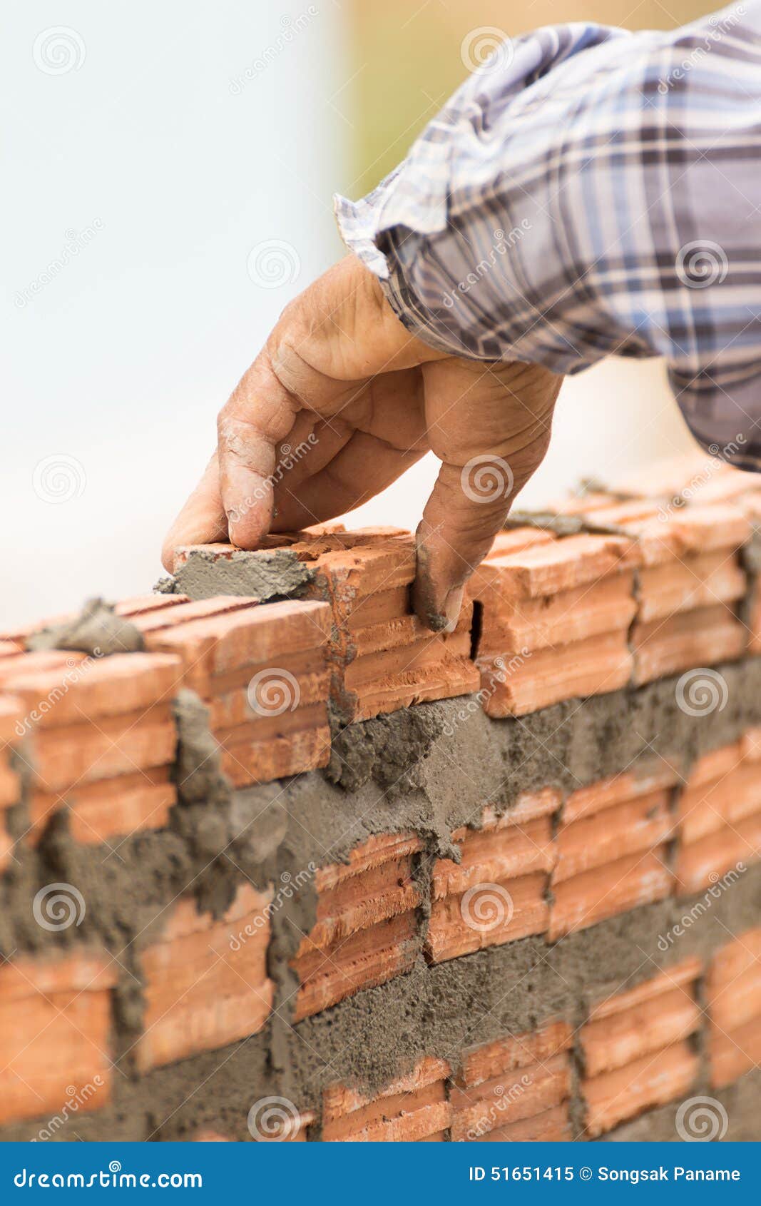 Bricklayer Working With Ceramsite Concrete Blocks. Walling Stock ...