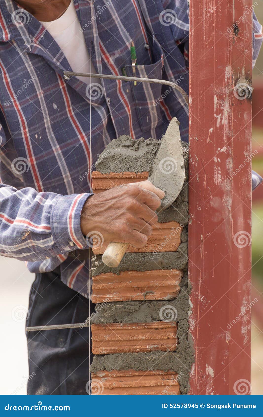 Bricklayer Working in Construction Site of Brick Wall Stock Image ...
