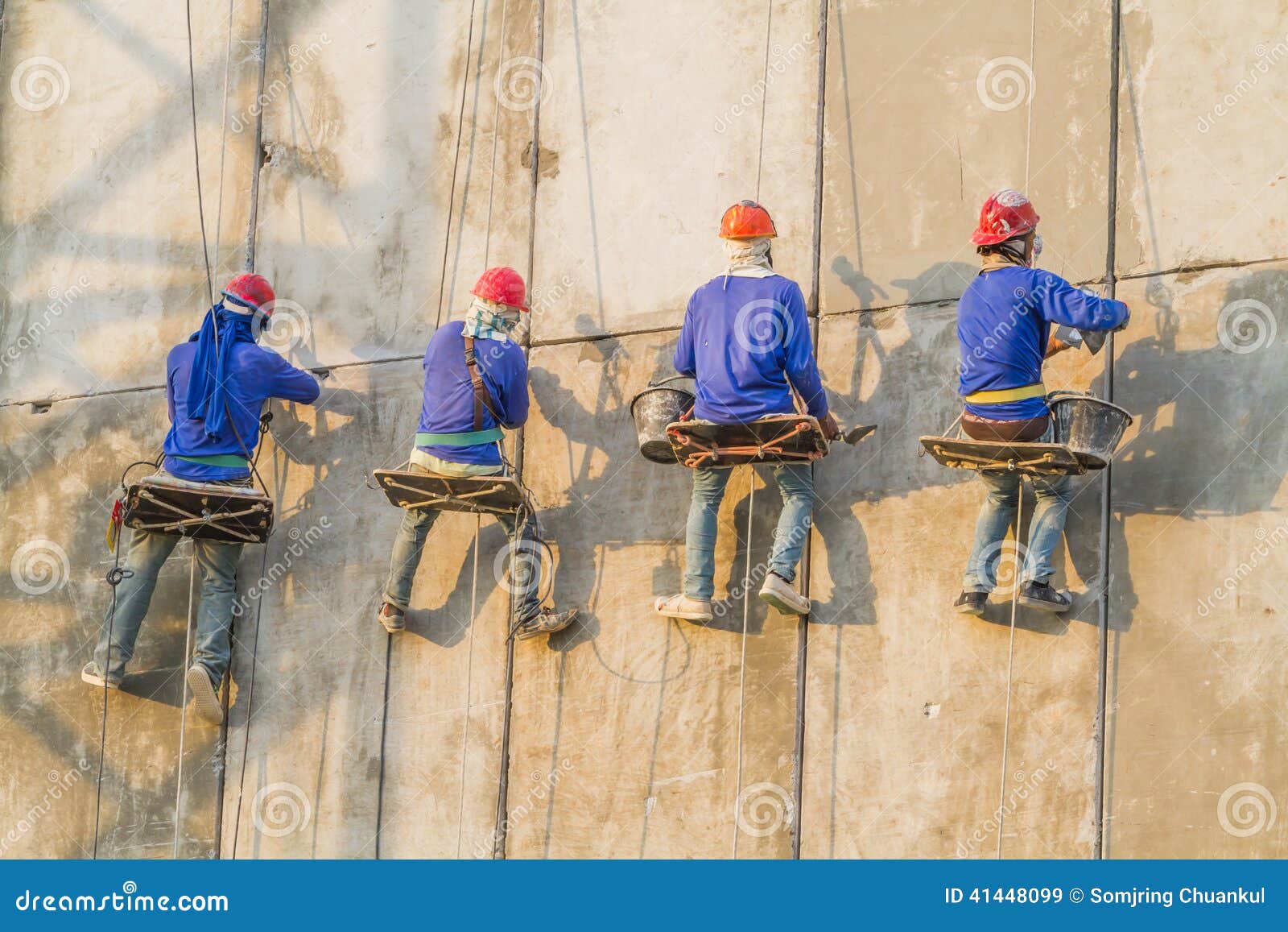 Bricklayer Working With Ceramsite Concrete Blocks. Walling Stock ...