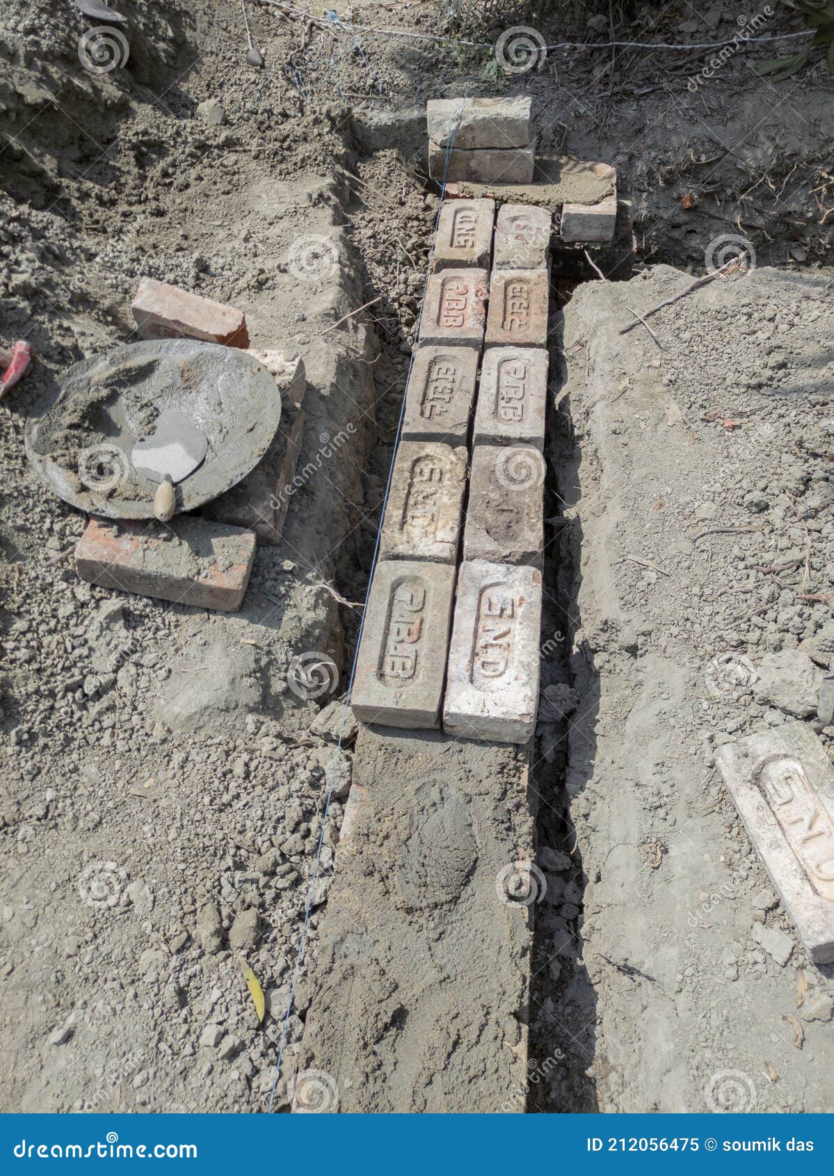 Close Up of Bricklayer Installing Bricks on Construction Site of India ...