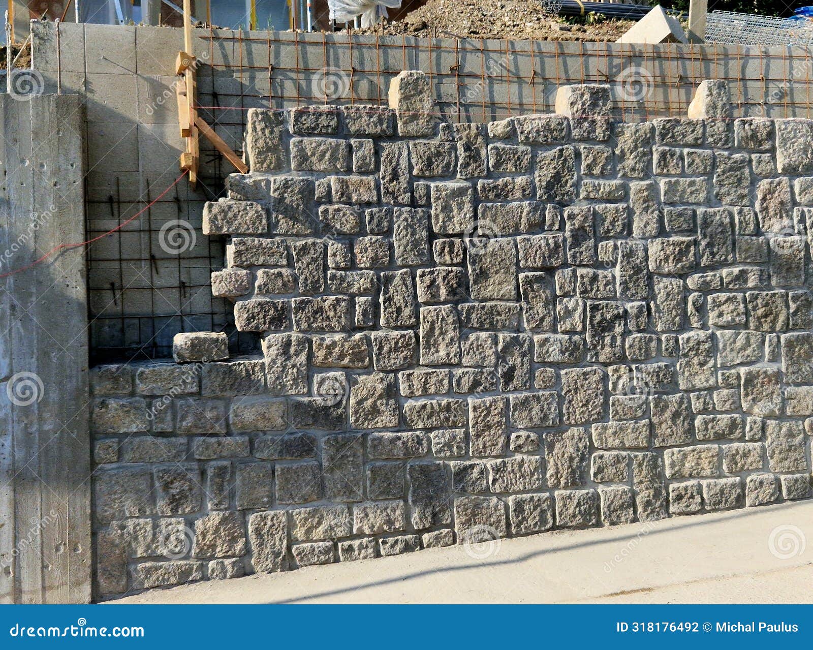 Bricklayers Tiling The House With Sandstone Stones. They Connect Stones ...