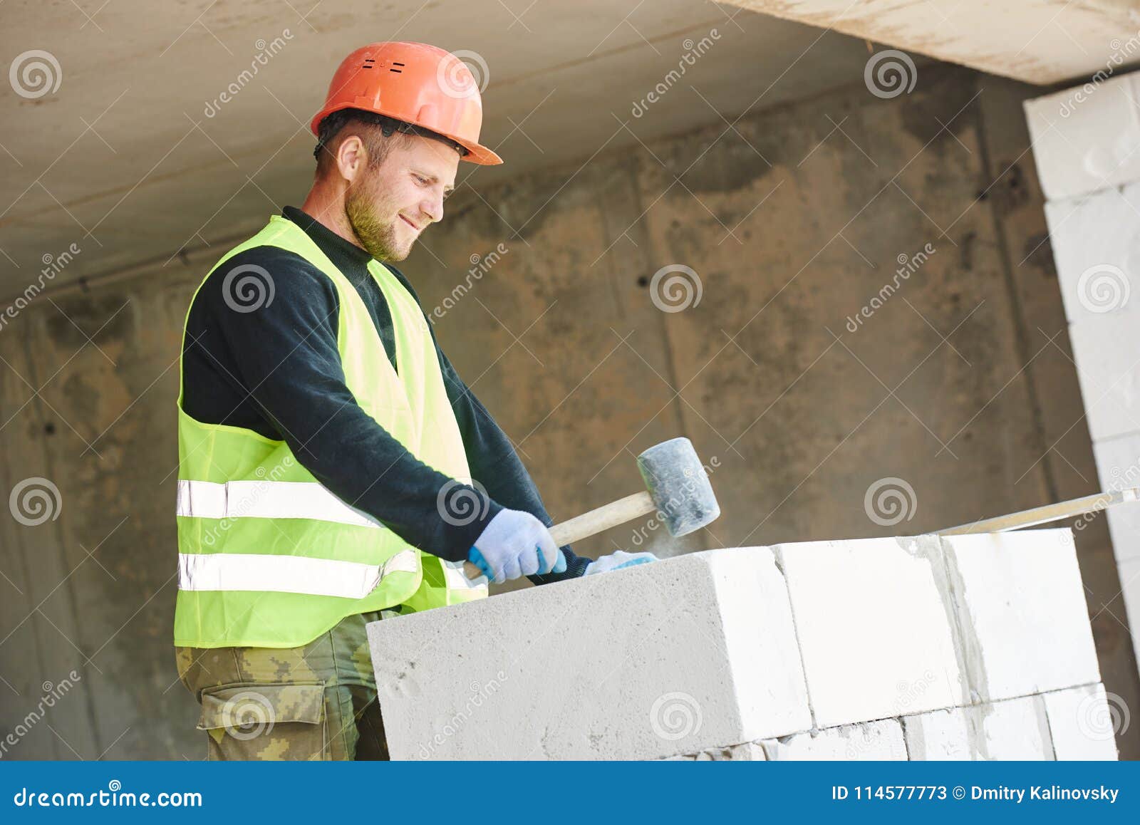 Bricklayer Builder Working with Autoclaved Aerated Concrete Blocks ...