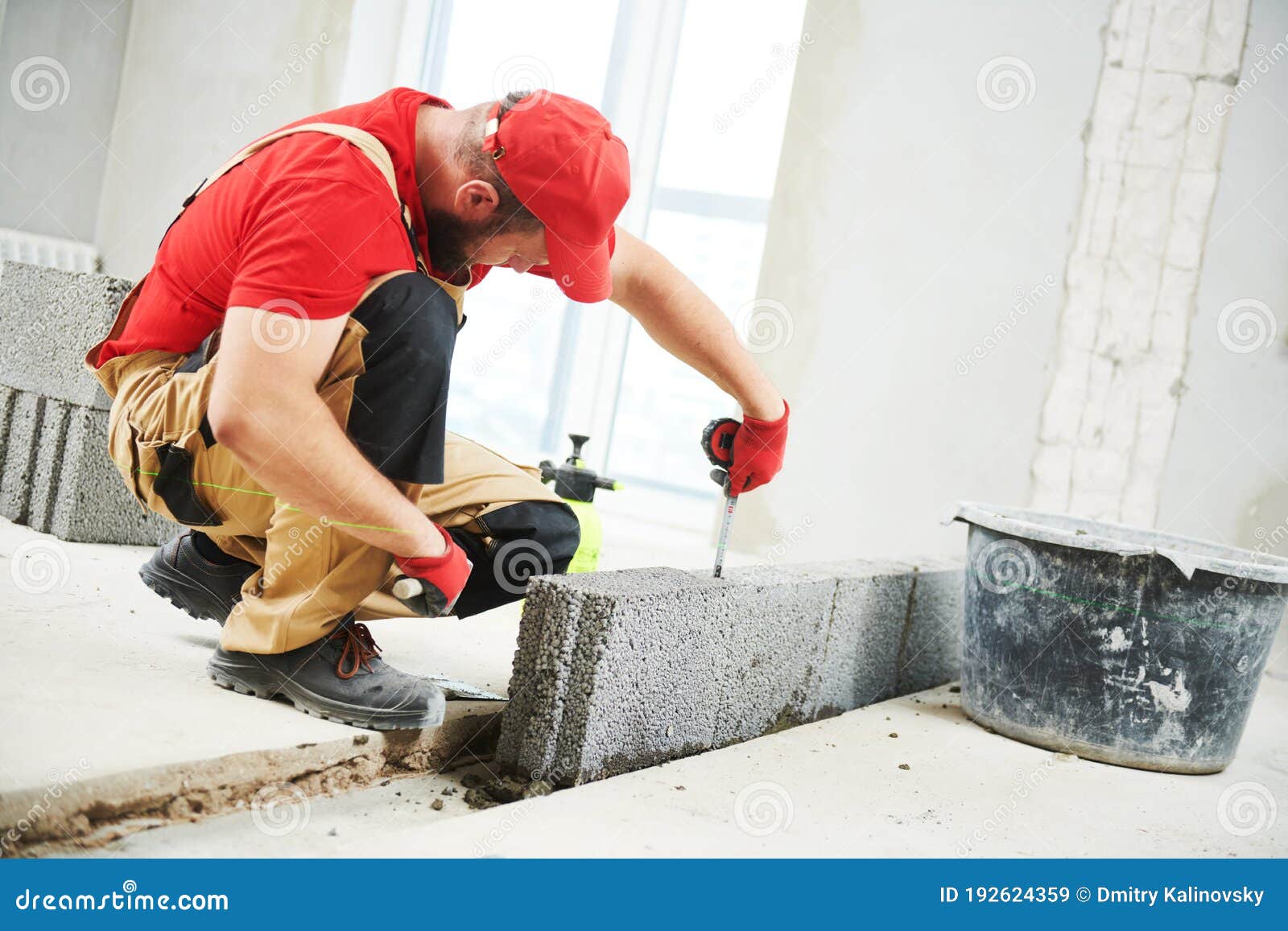 Bricklayer Builder Working with Ceramsite Concrete Blocks. Walling ...