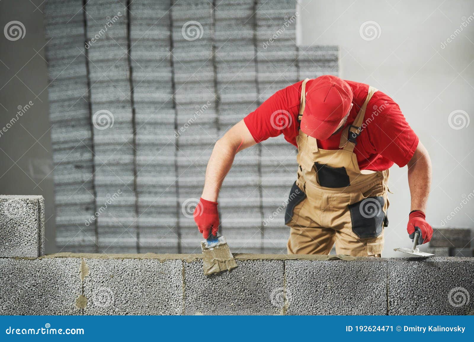 Bricklayer Builder Working With Autoclaved Aerated Concrete Blocks ...