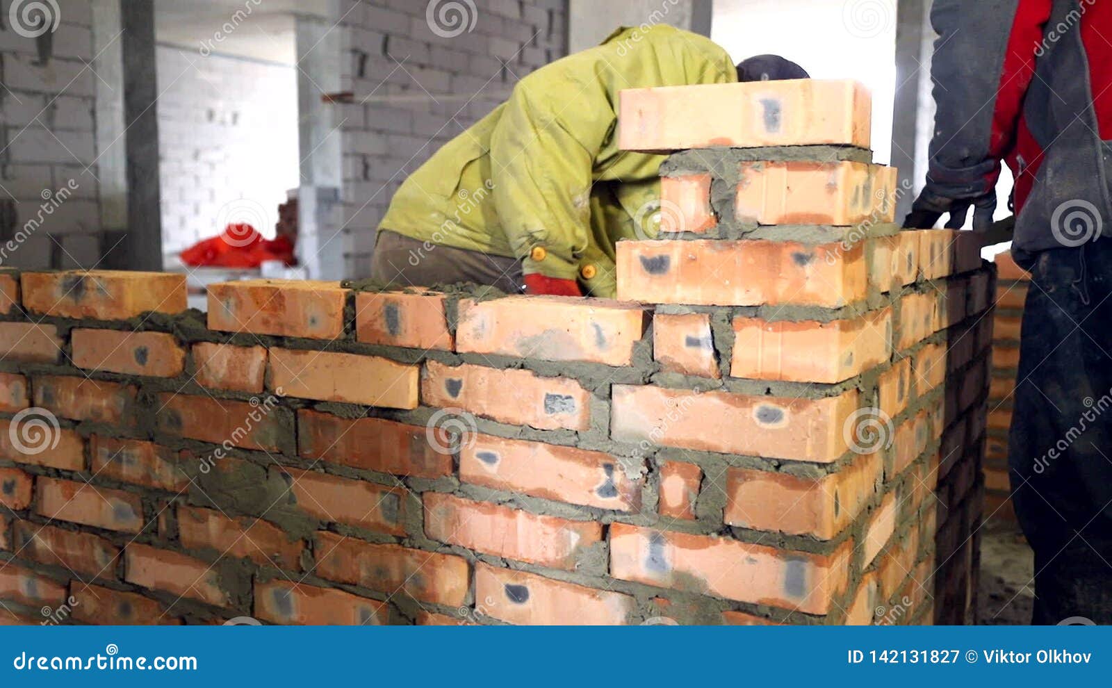 Bricklaying. Hands that Put a Brick on a Construction Site Stock Video ...