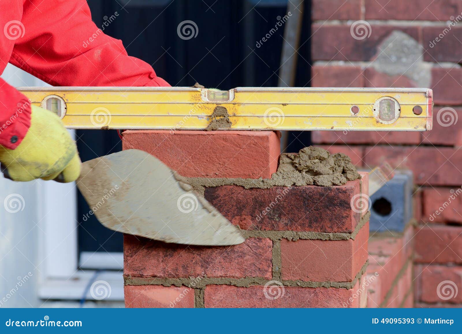 Bricklaying - Laying a Brick Stock Image - Image of outside ...