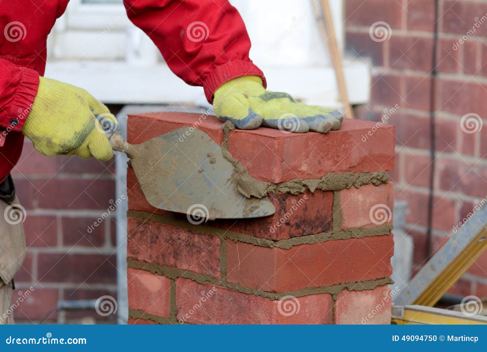 Bricklaying - Laying a Brick Stock Photo - Image of outside, remving ...