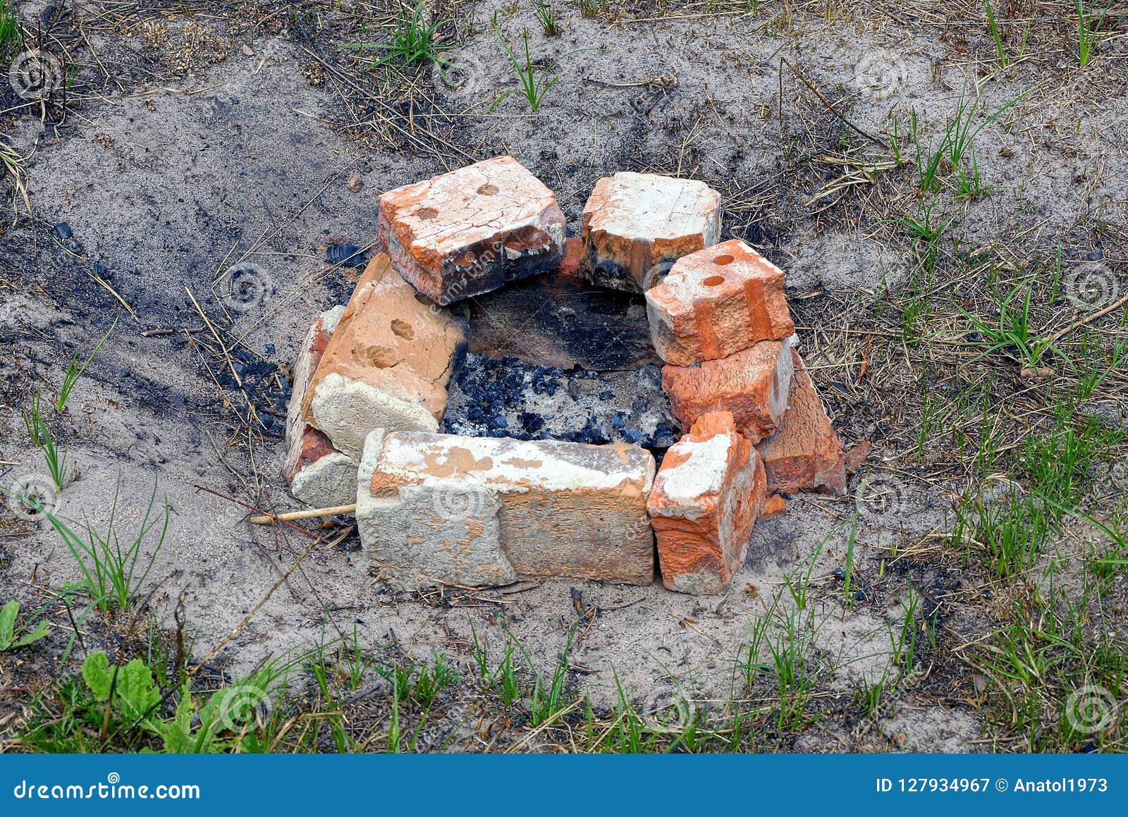 Bricks Around the Ash of an Extinct Fire on the Ground Stock Image ...