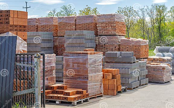 Construction Material Storage Stock Photo - Image of commercial, sacks ...