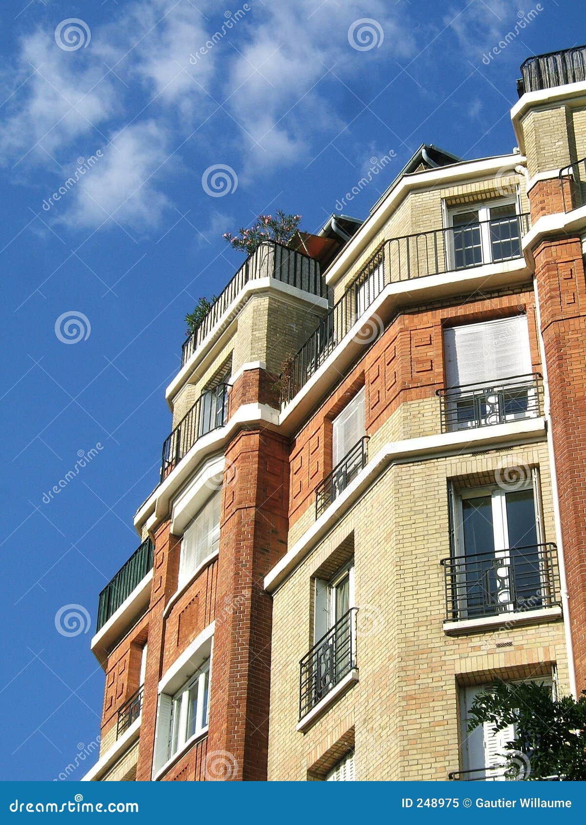 Bricks building in the sky stock image. Image of design - 248975