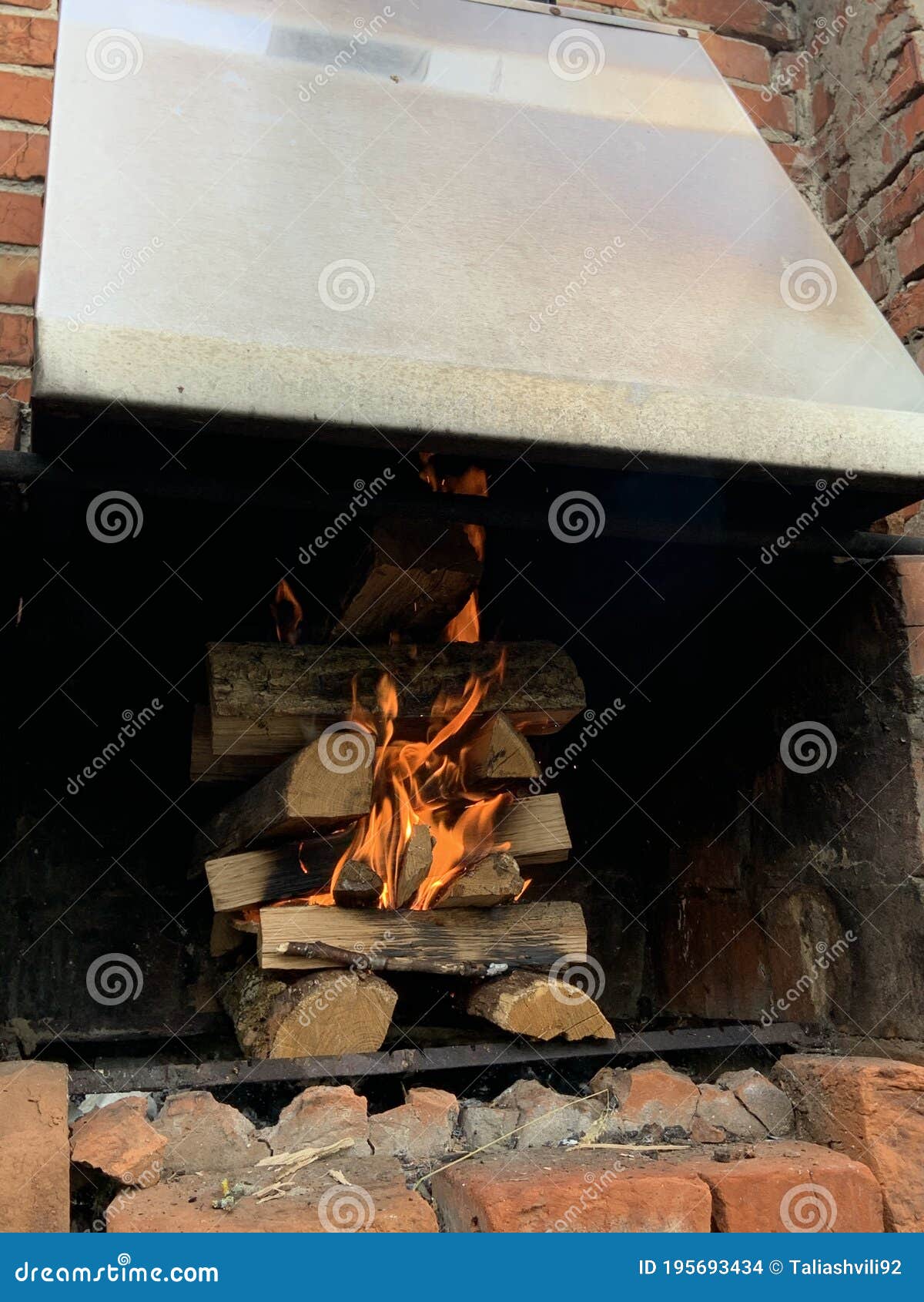 Bricks Campfire with Burning Firewood Stock Photo - Image of flame ...