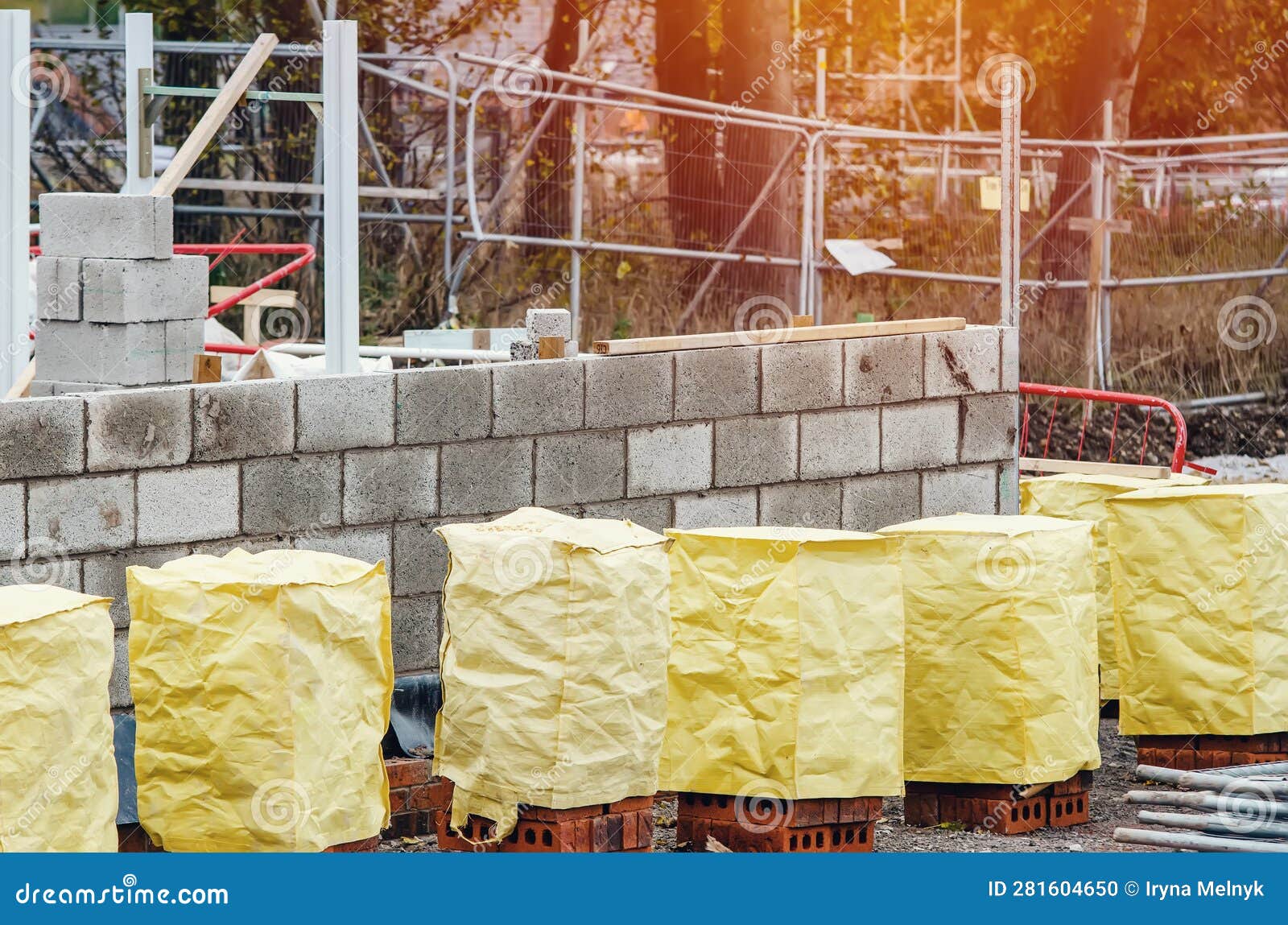 Bricks and Concrete Blocks Delivered To Construction Site and Placed ...