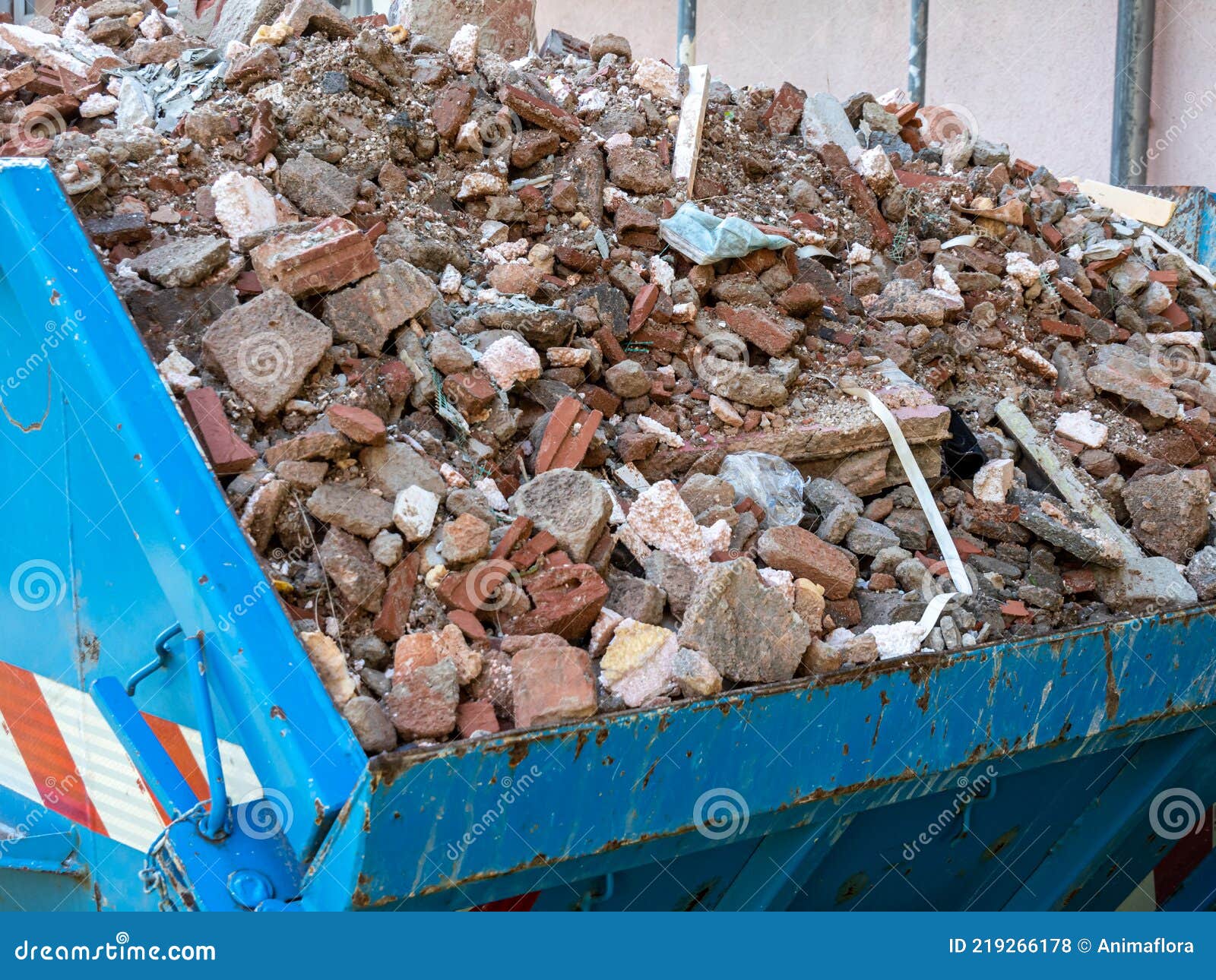 Bricks in a Construction Waste Container Stock Photo - Image of pipe ...