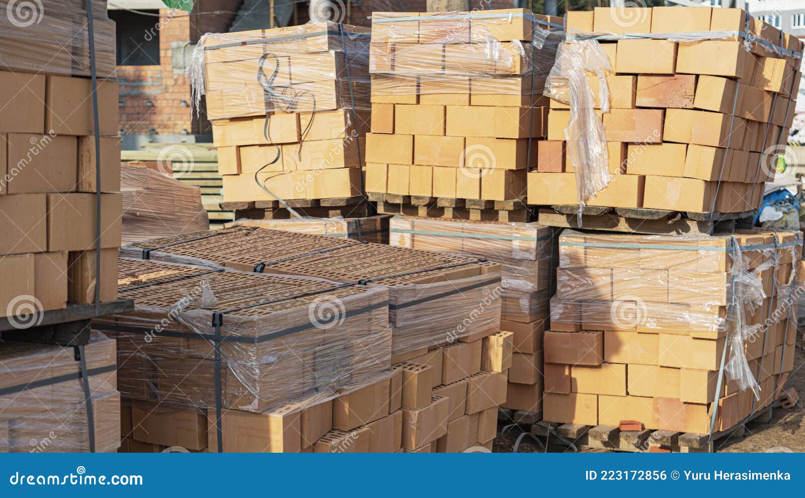 Bricks in Pallets on a Construction Site. Construction Materials Stock ...