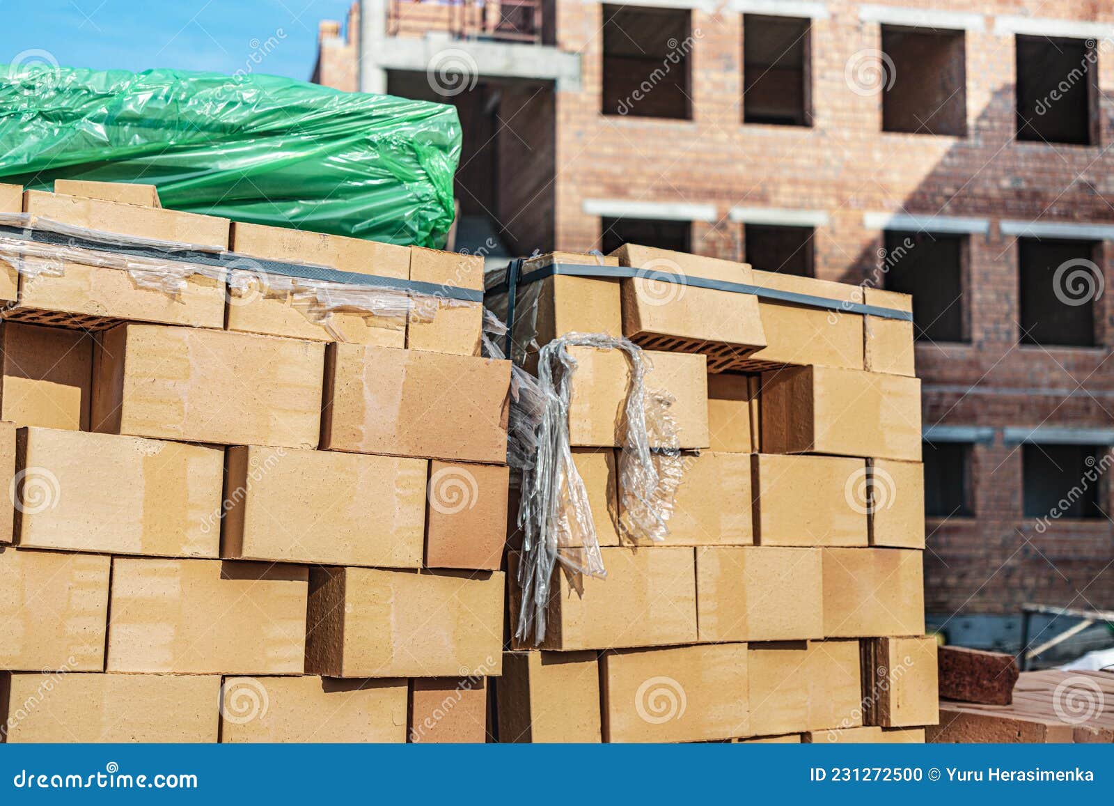 Bricks in Pallets on a Construction Site. Construction Materials Stock ...