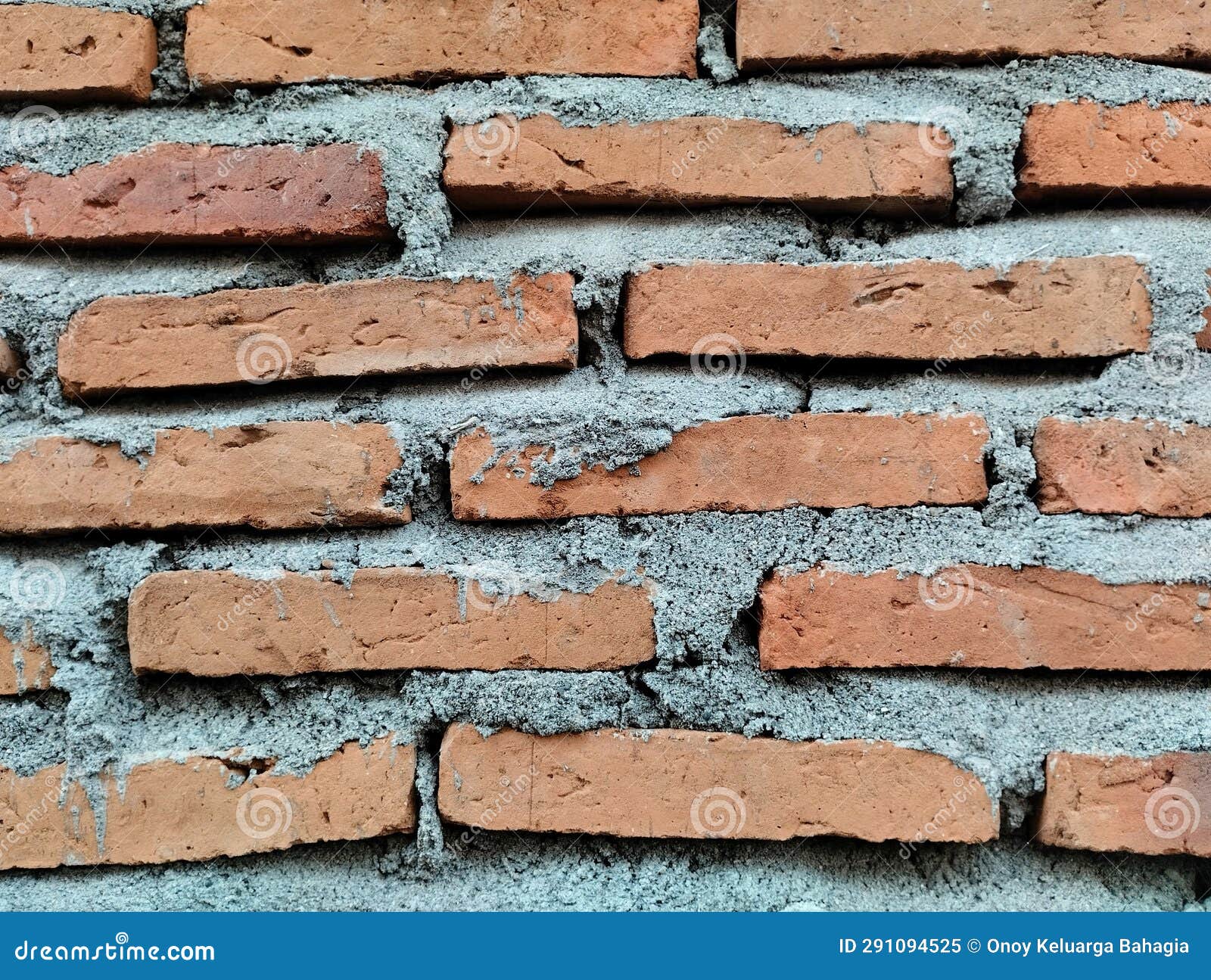 Bricks stacked with cement stock image. Image of soil - 291094525