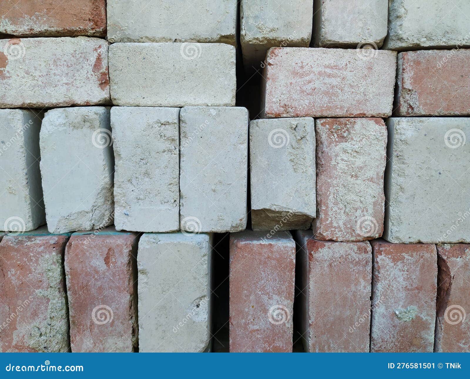 Bricks stacked in piles. stock image. Image of stonewall - 276581501
