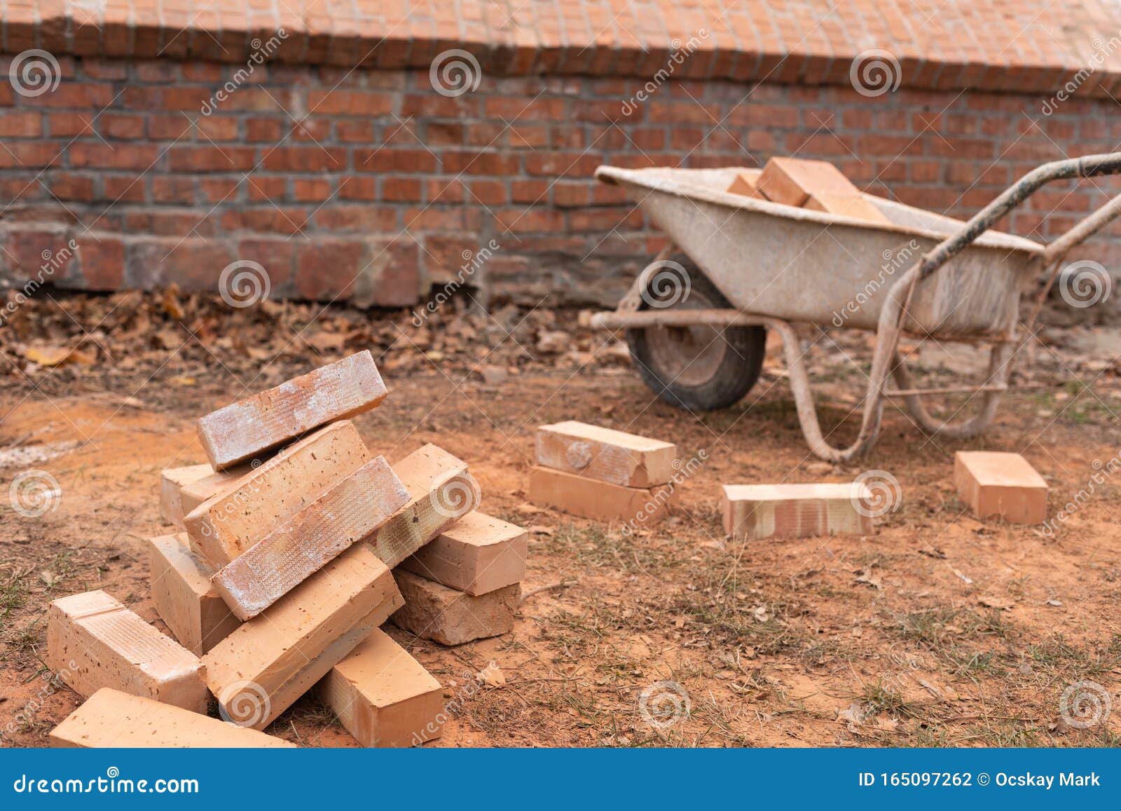 Bricks in a wheelbarrow stock photo. Image of bricklayer - 165097262