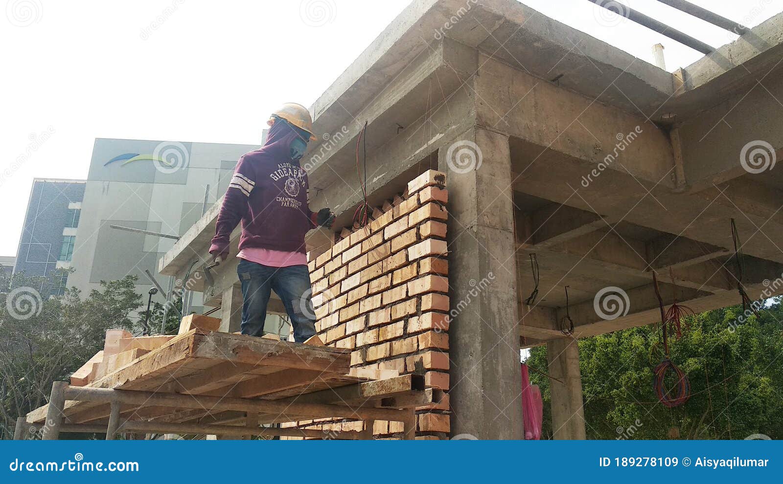 Brickwork By Construction Workers At The Construction Site. Editorial ...