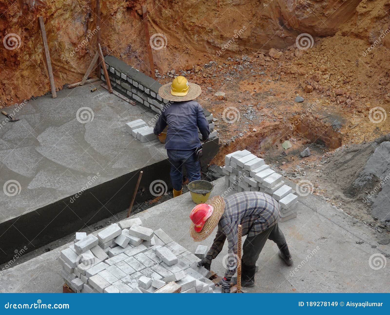 Brickwork By Construction Workers At The Construction Site. Editorial ...