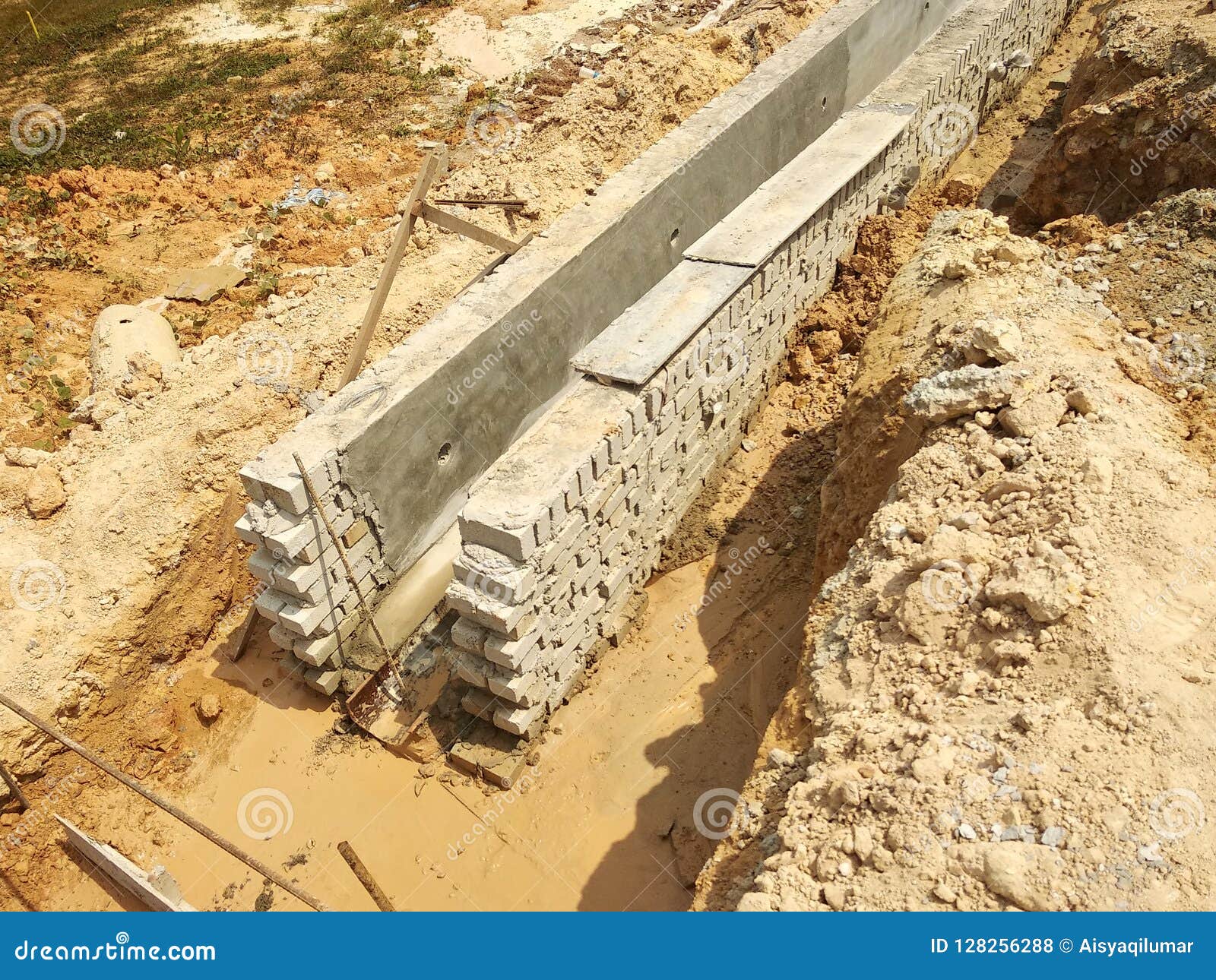 Brickwork By Construction Workers At The Construction Site. Editorial ...