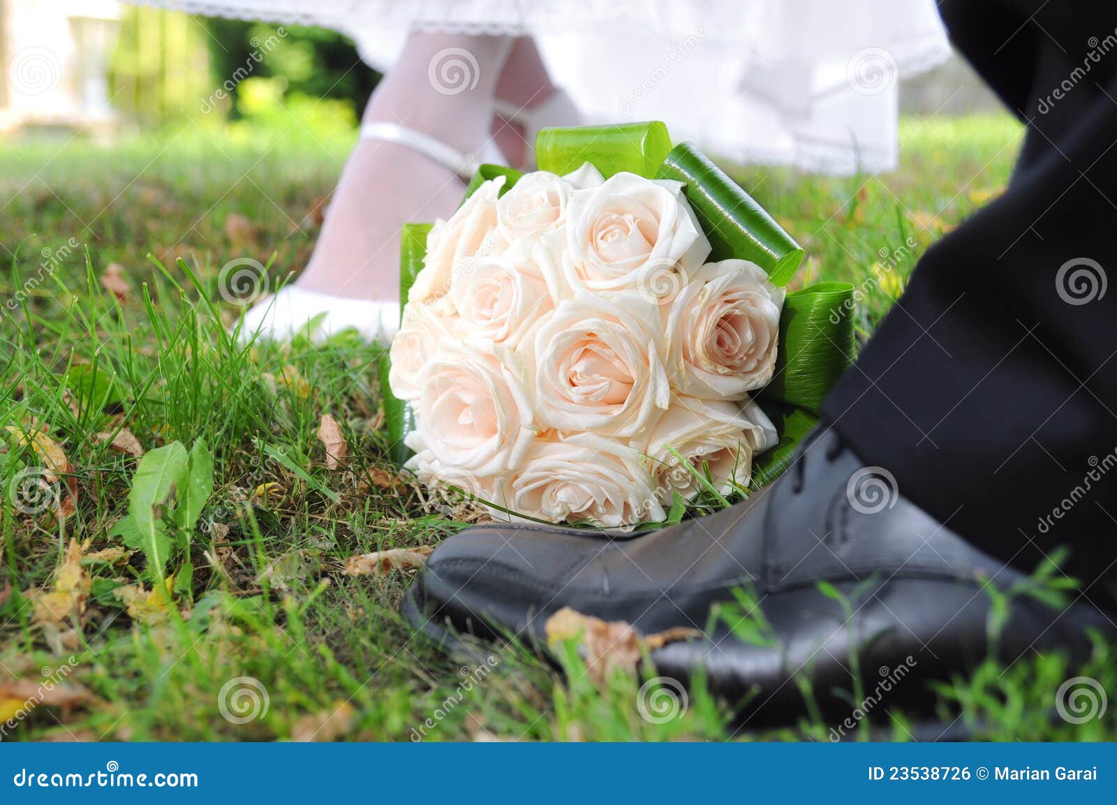 Bridal Bouquet of Roses with the Bride and Groom Stock Photo - Image of ...