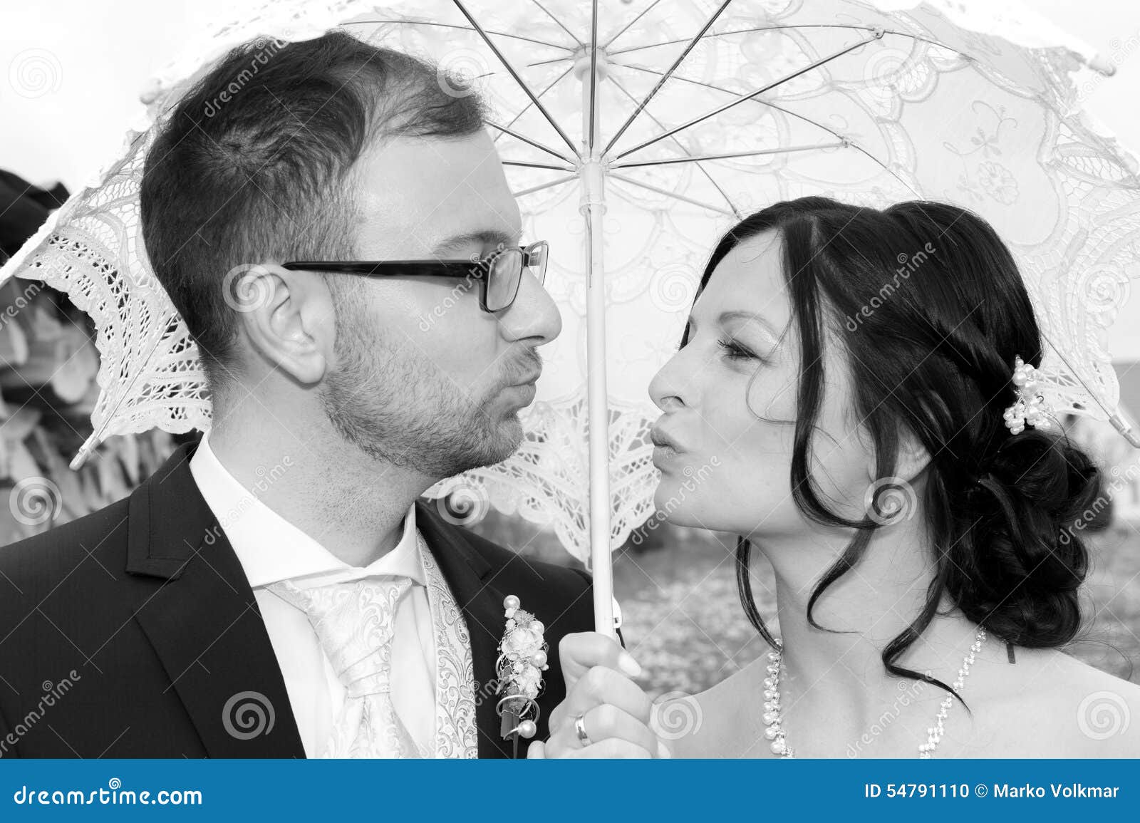 Bridal Couple Together in Front of Sunshade Stock Photo - Image of ...