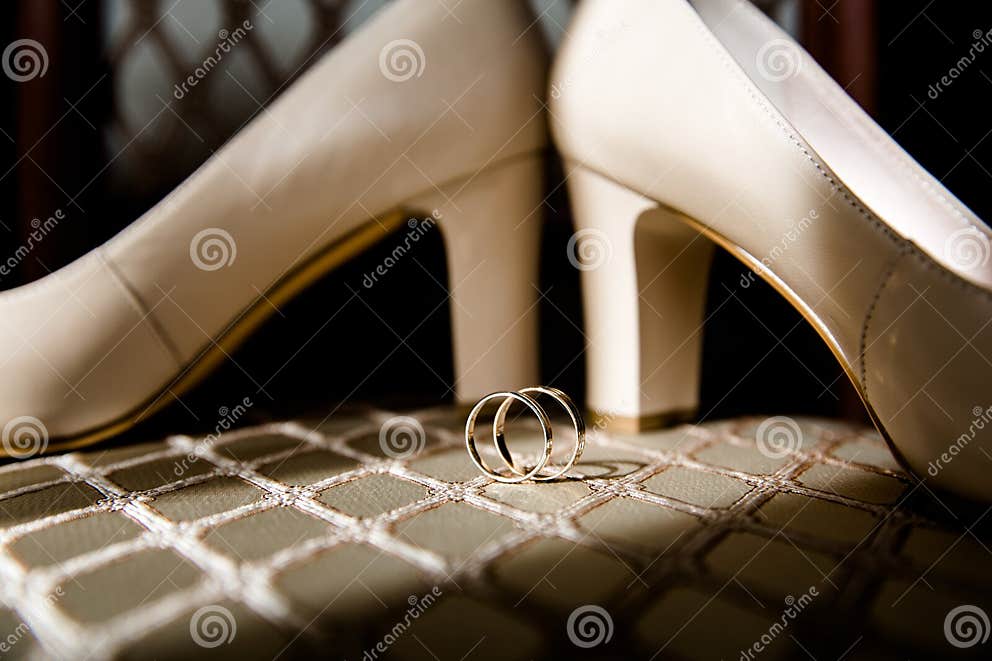 Bridal Elegance: White Heels and Wedding Ring Reflection Stock Image ...
