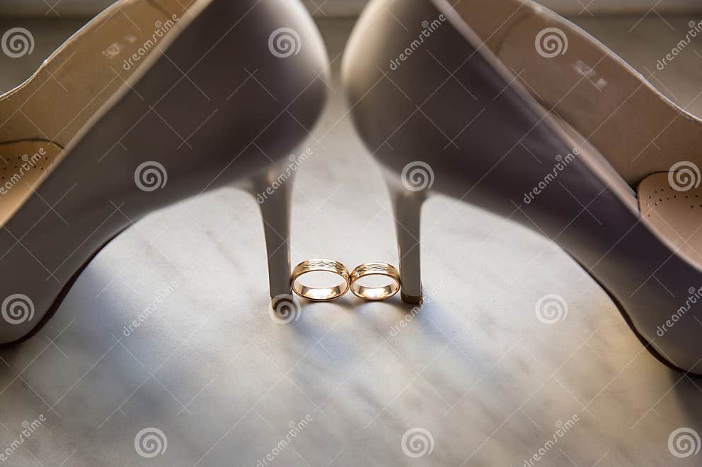 Bridal Elegance: White Heels and Wedding Ring Reflection Stock Image ...