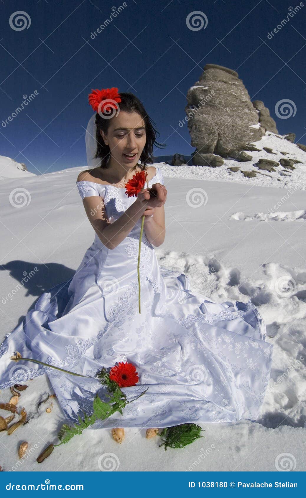 Bride Adorned with Crimson Flowers. Stock Photo - Image of covered ...