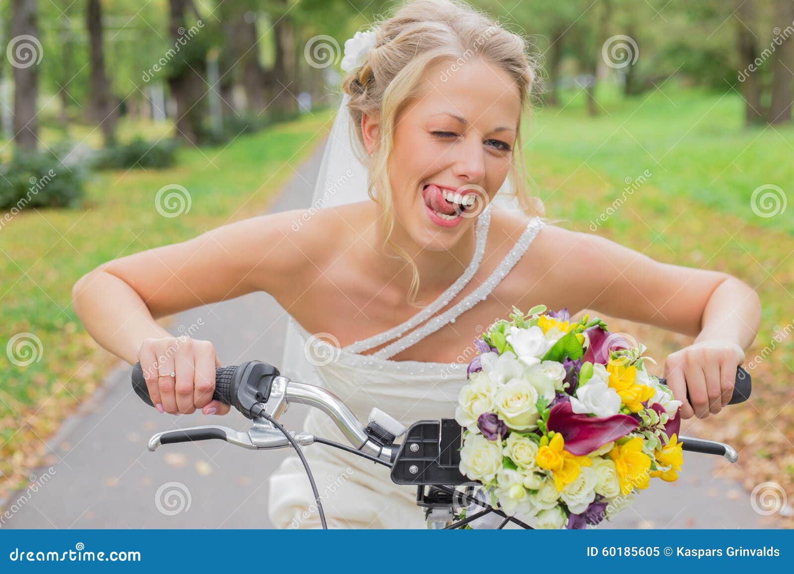 Bride on a Bicycle Being Flirty Stock Image - Image of bridal, humorous ...