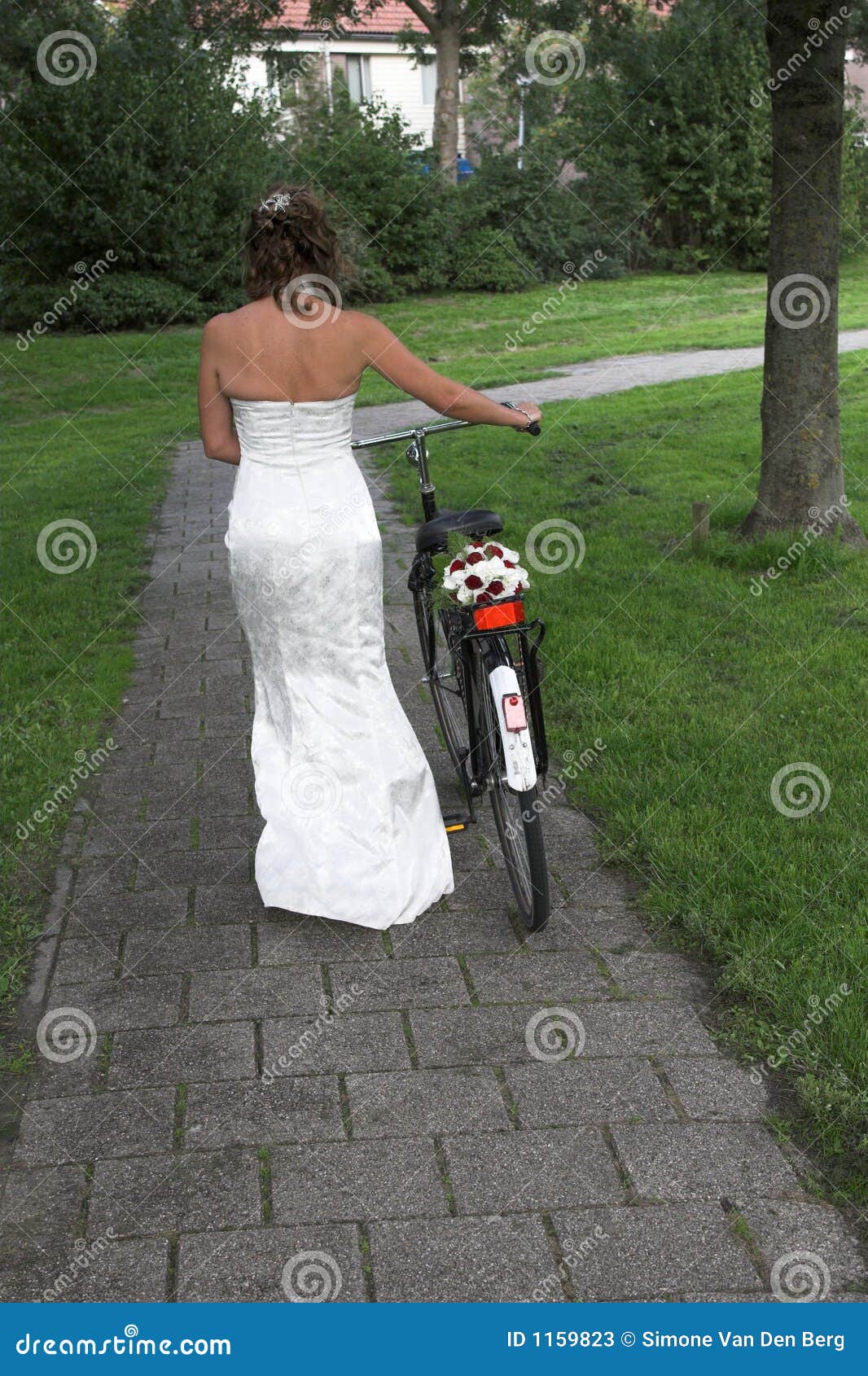 Bride on a bike stock image. Image of married, bride, standing - 1159823
