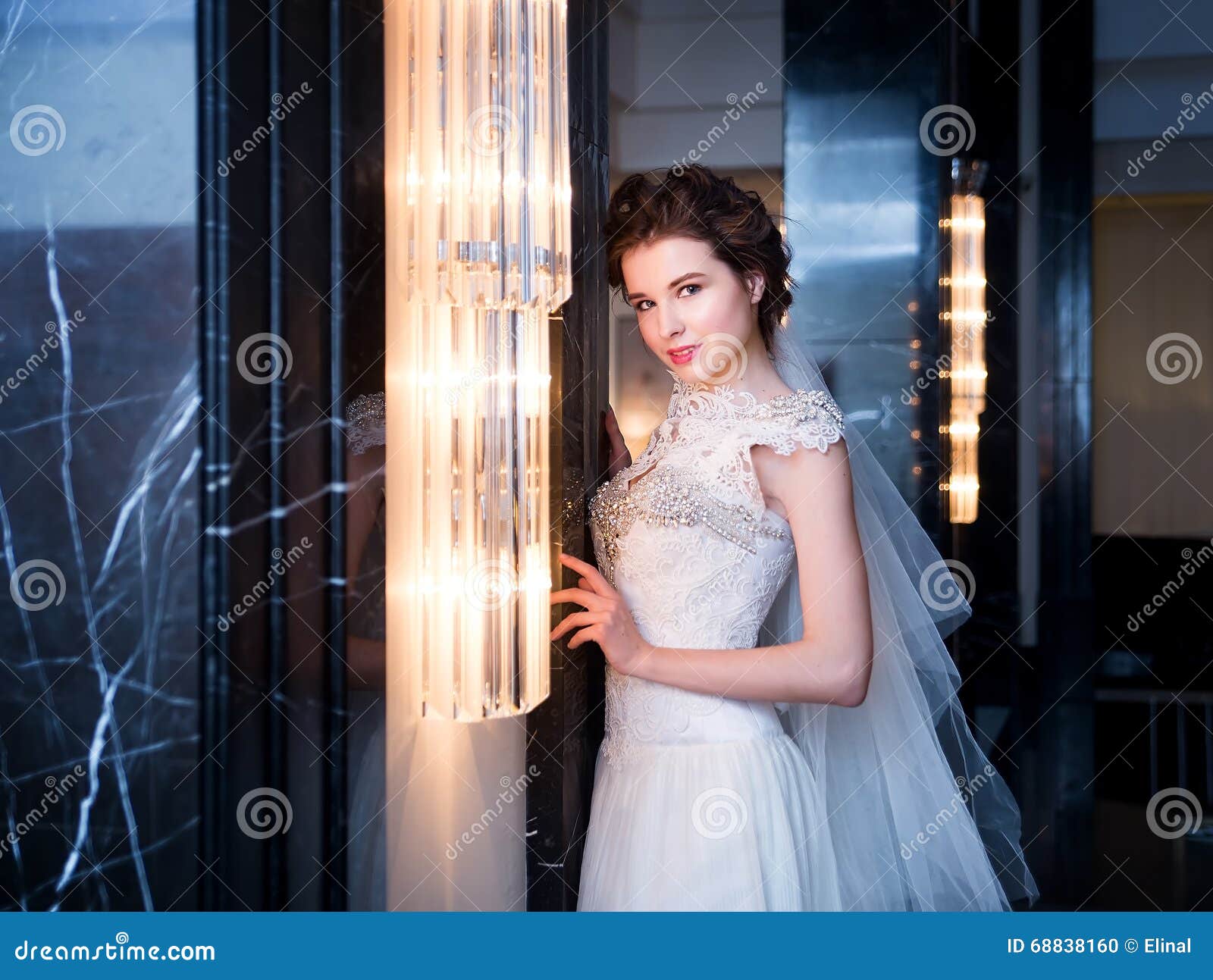 Bride in Blue Interior in Long White Dress. Stock Photo - Image of ...