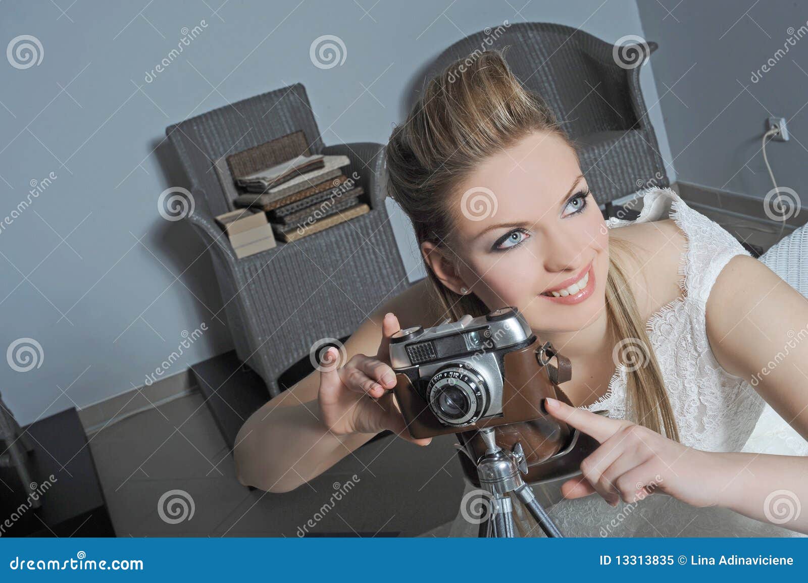Bride with camera stock image. Image of dress, photographed - 13313835