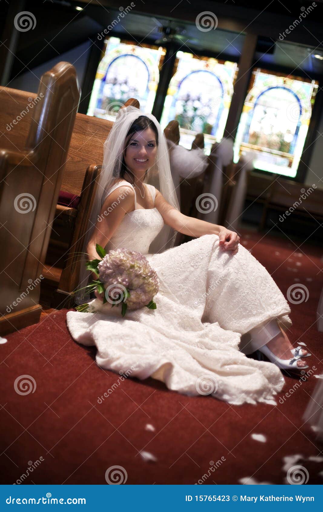 Bride in a church stock image. Image of face, gown, sitting - 15765423