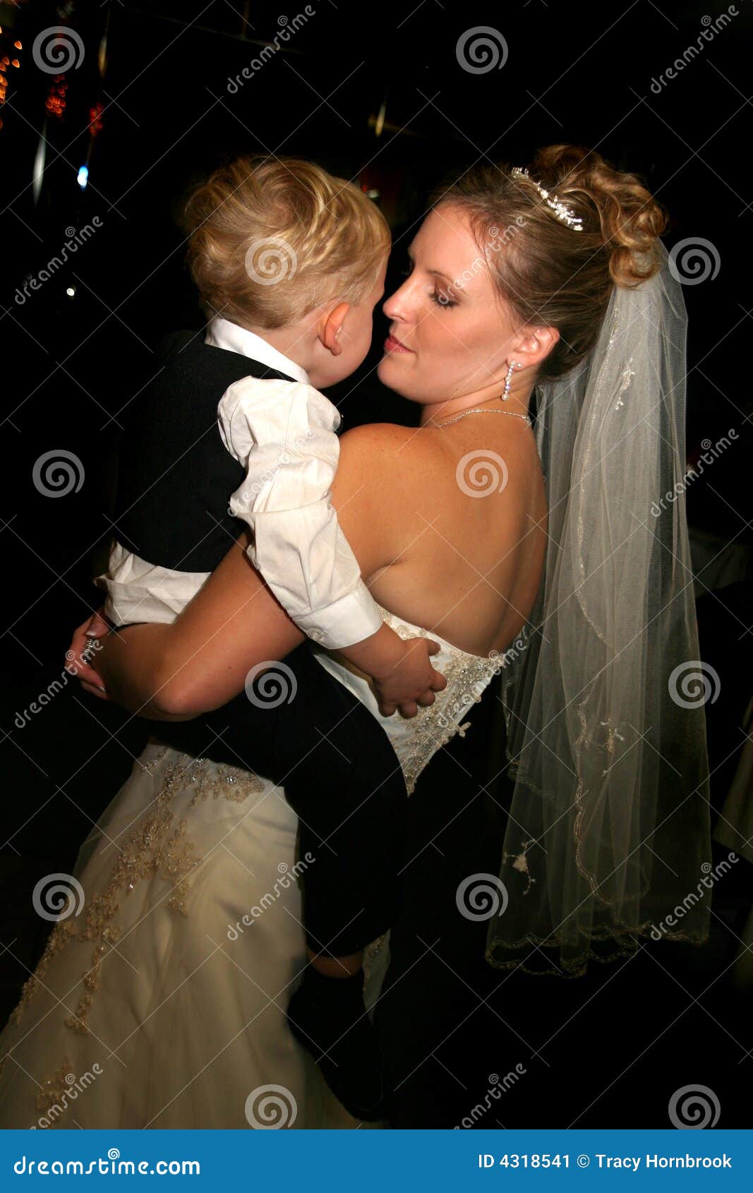 Bride dancing with son stock image. Image of beauty, blonde - 4318541