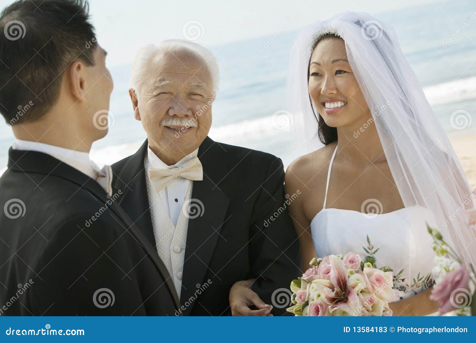 Bride and Father with Groom at Beach Wedding Stock Image - Image of ...