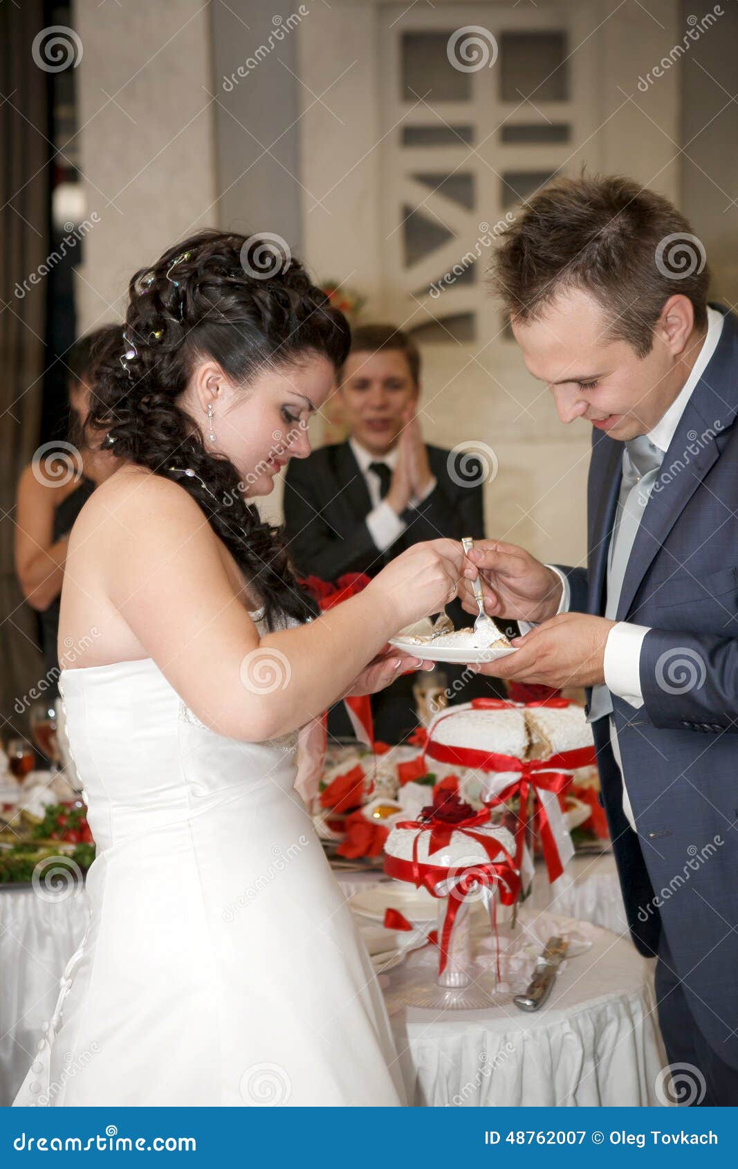 Bride Feeding Wedding Cake To Groom Stock Image - Image of bride ...