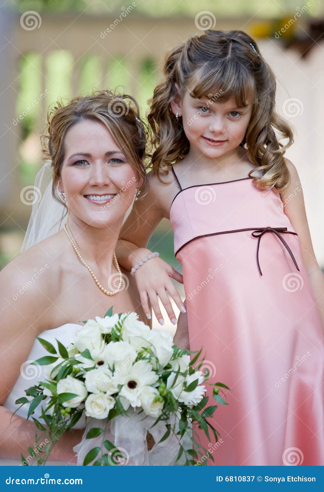 Bride with Flower Girl stock image. Image of girl, happy - 6810837